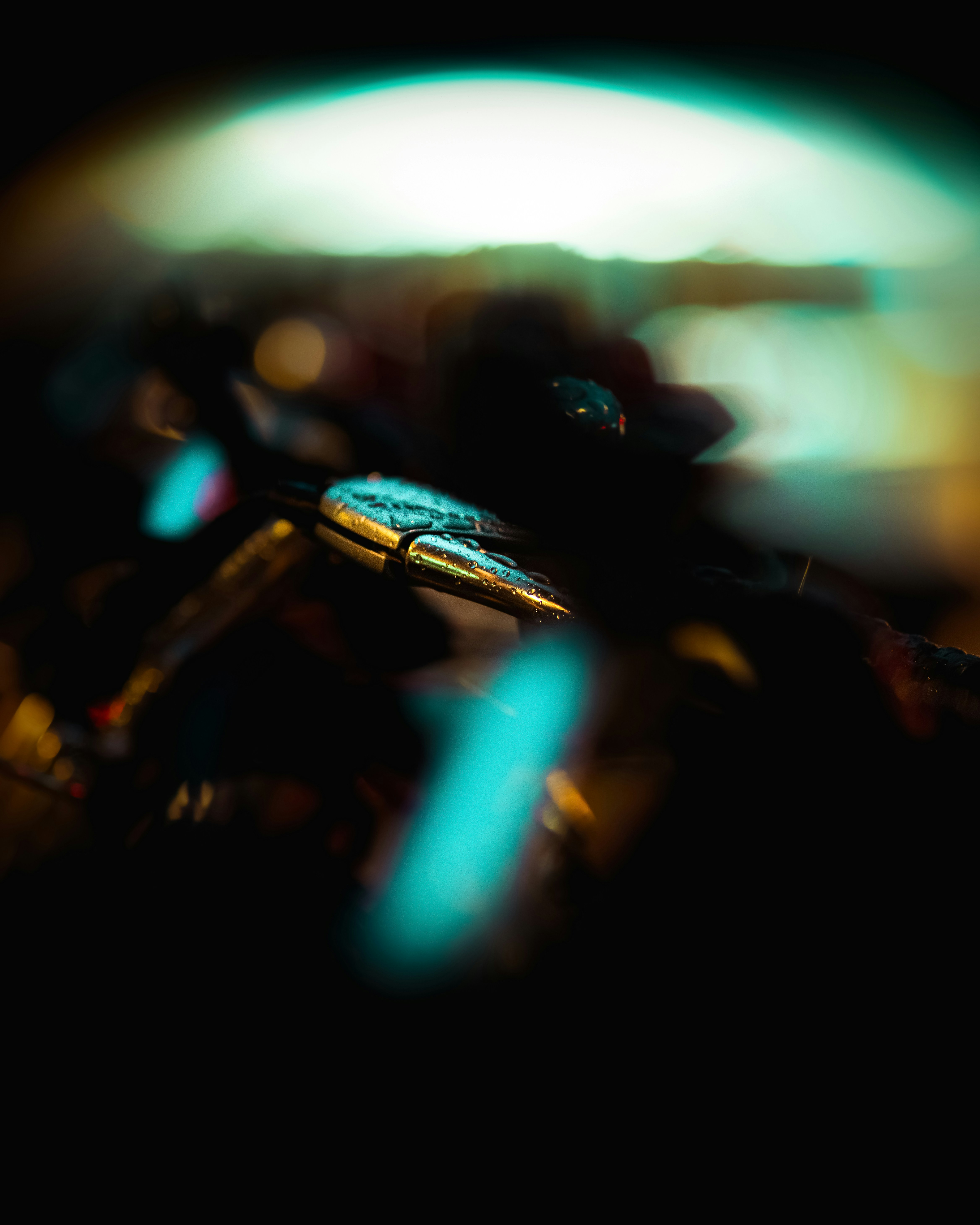 Glint among the Twisted Glass: a Close-Up of Abstract Debris in Neon Light