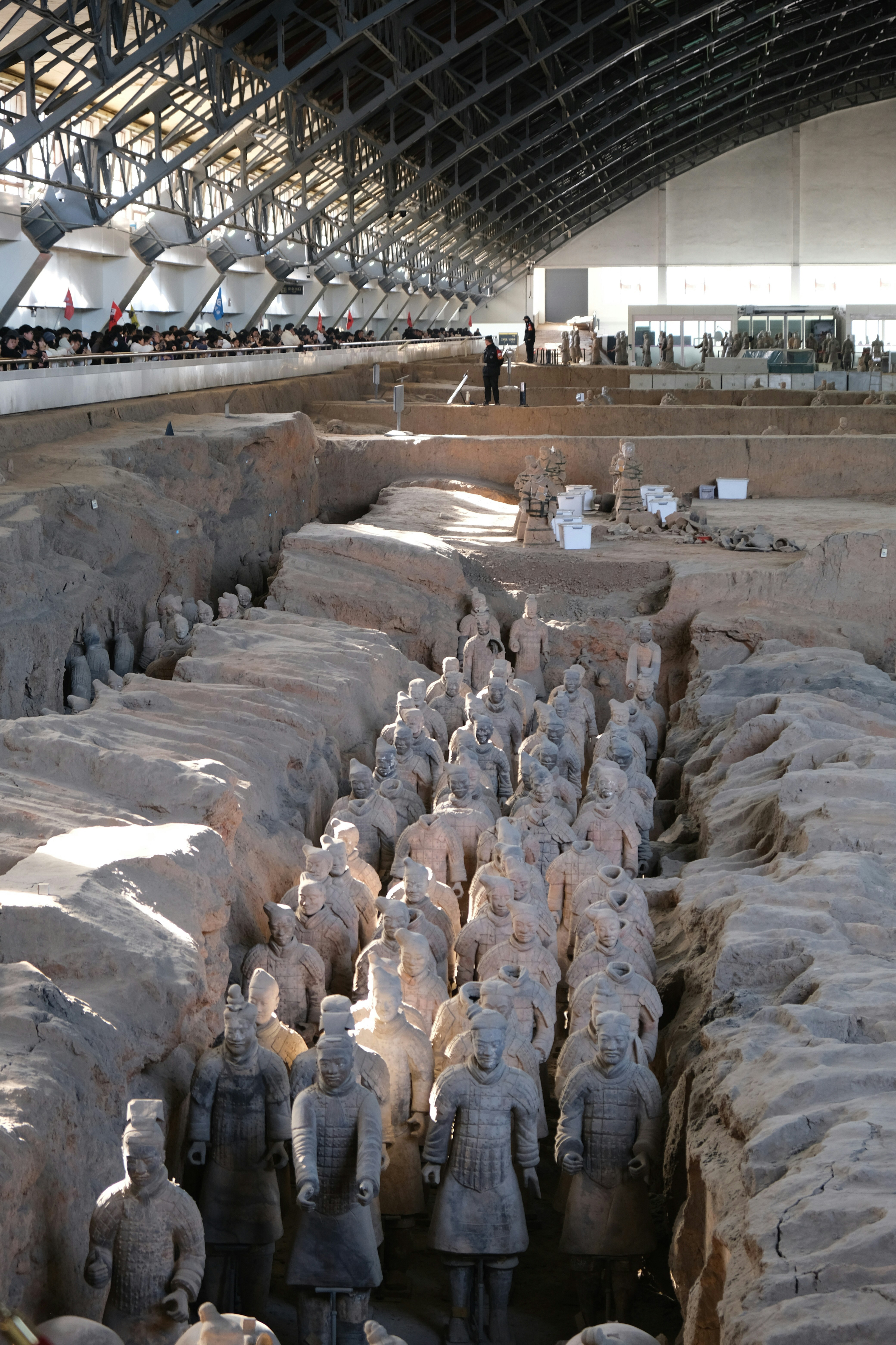 Unearthed Army: Terracotta Warriors Beneath a Modern Gallery Roof
