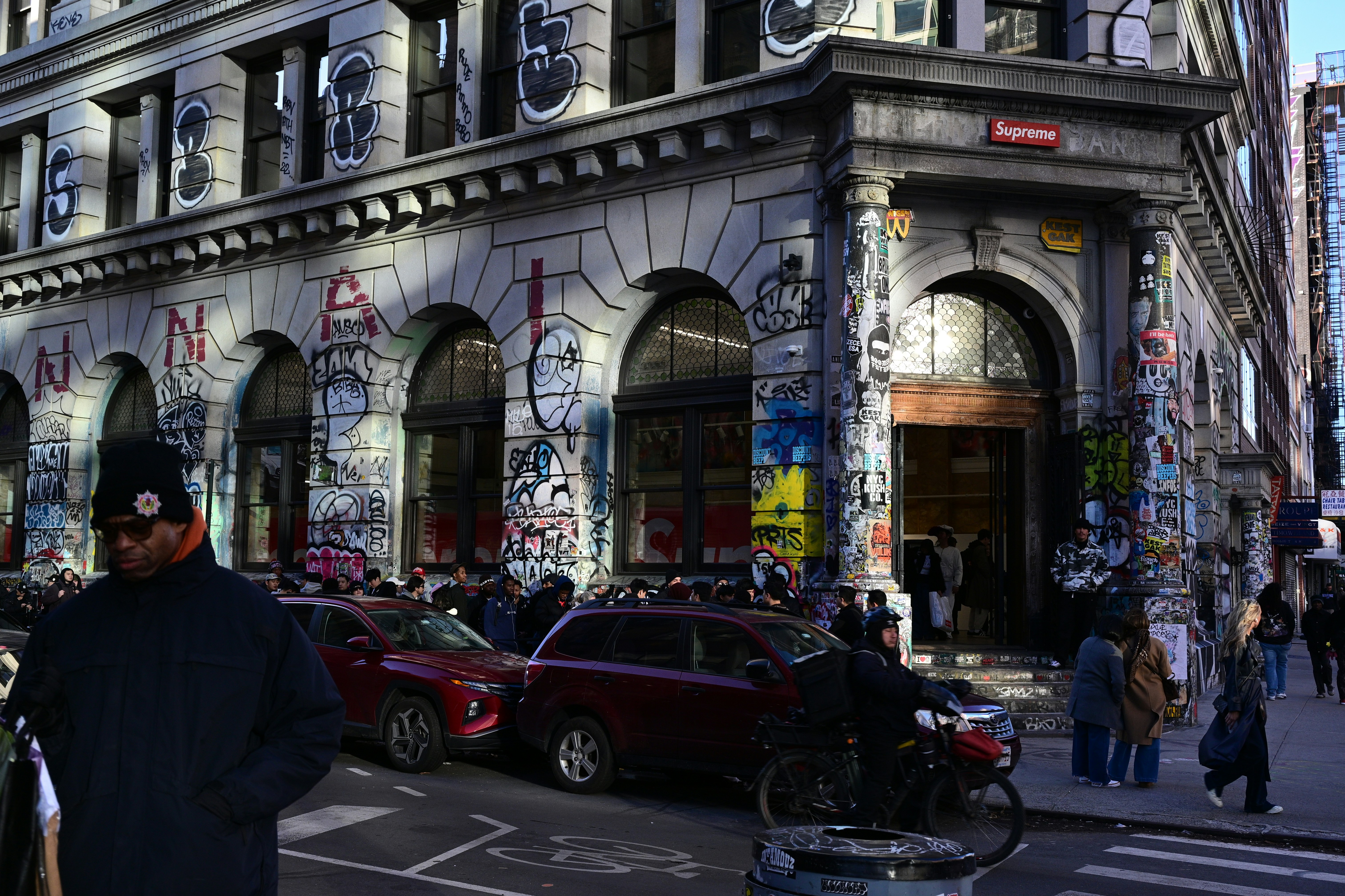Streetwise Portrait at a Graffiti-Stamped Corner