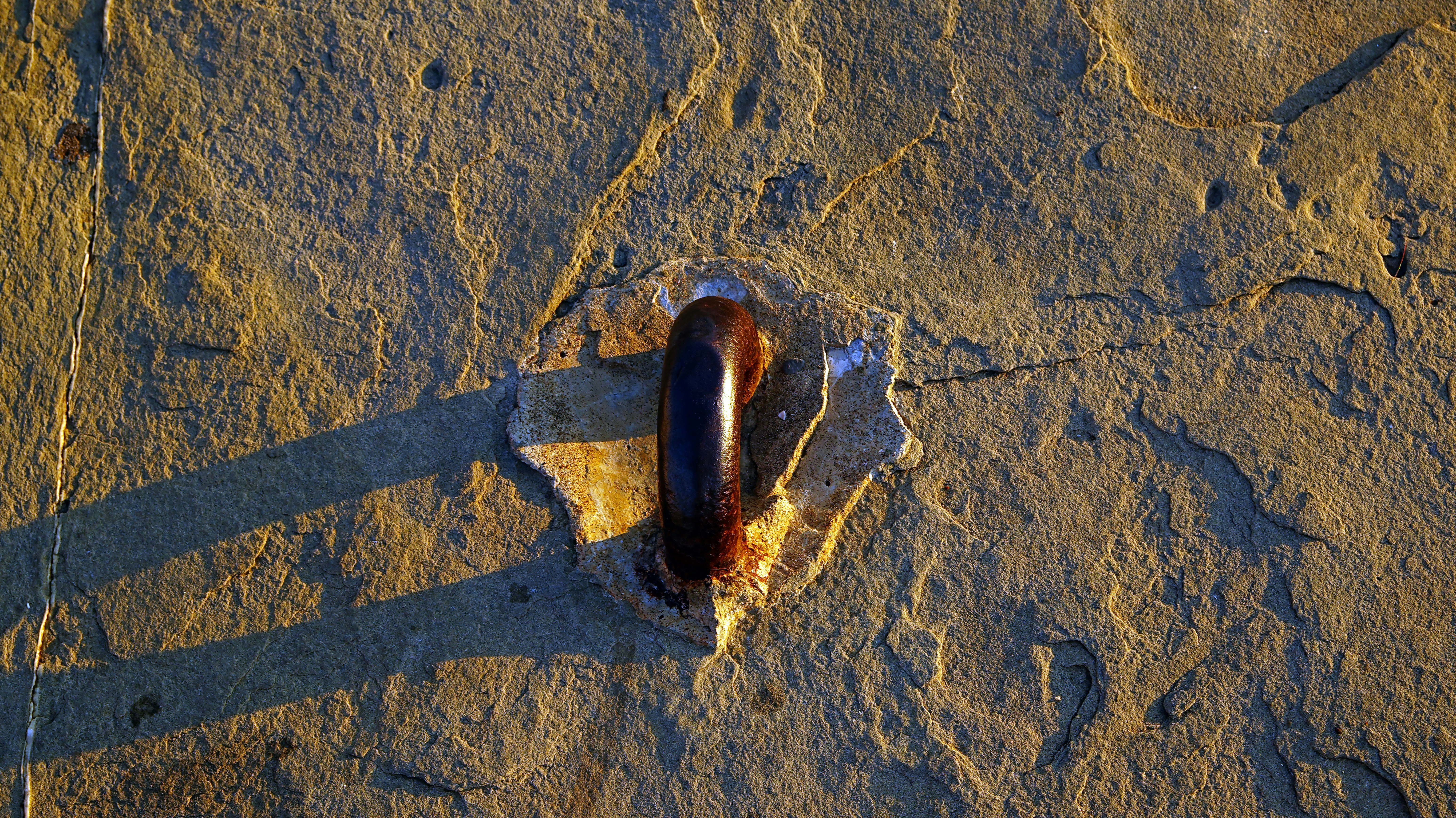 Rusty Shackle on Sunlit Sand