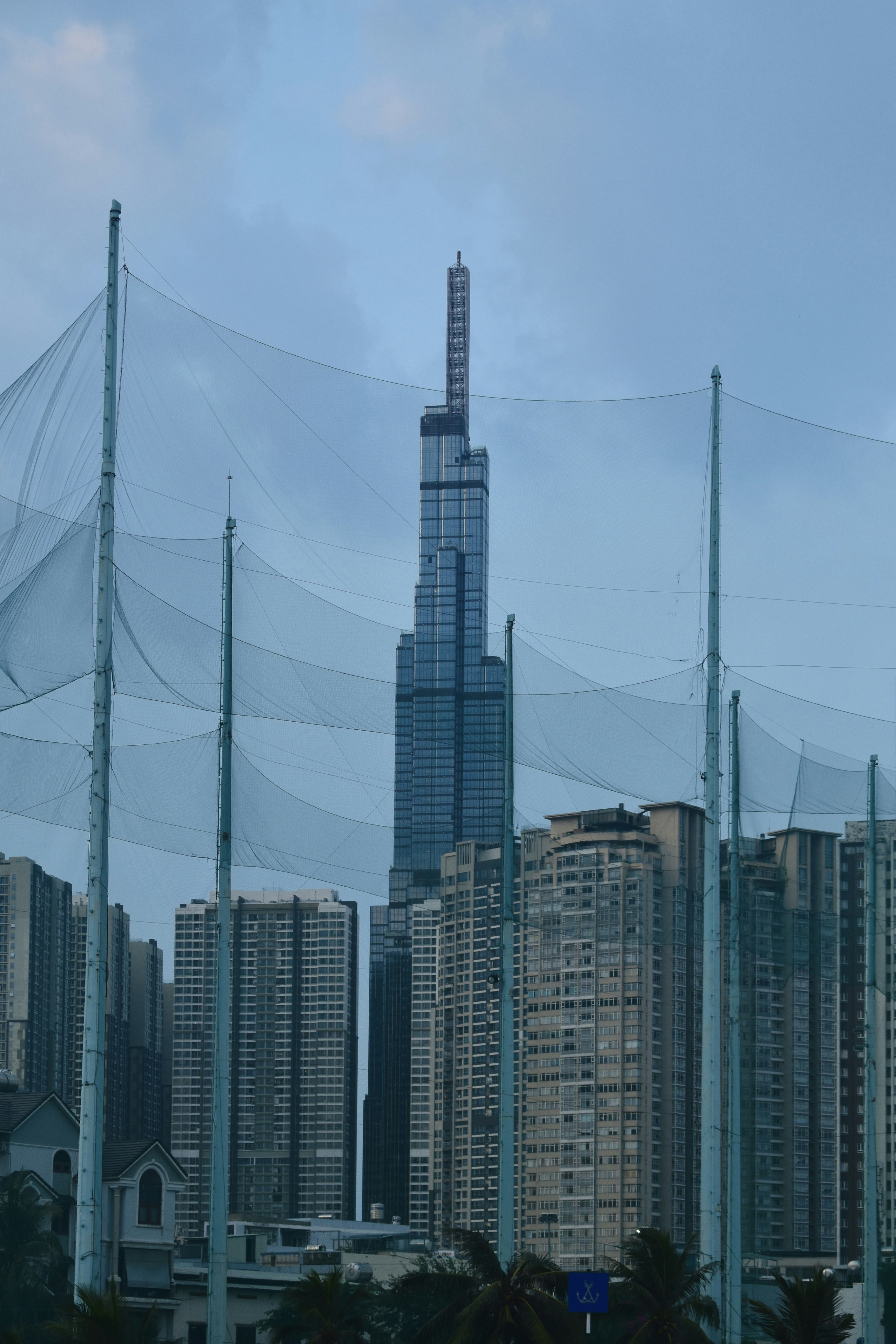 Skyline Sentinel: The Tallest Tower Rises Over a Netscape of High-Rrises