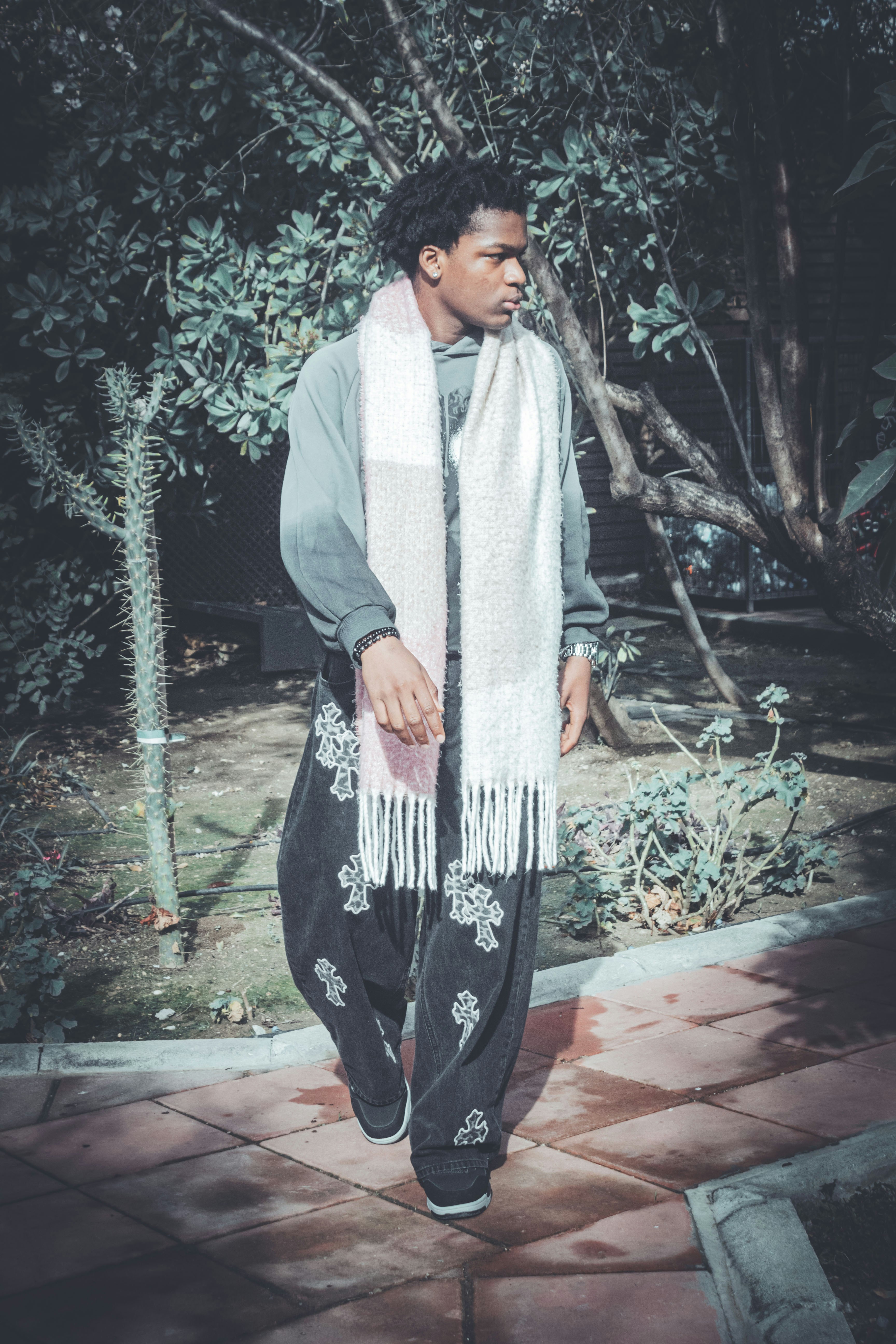 Scarved in Nightfall: A Quiet Moment Under Garden Light
