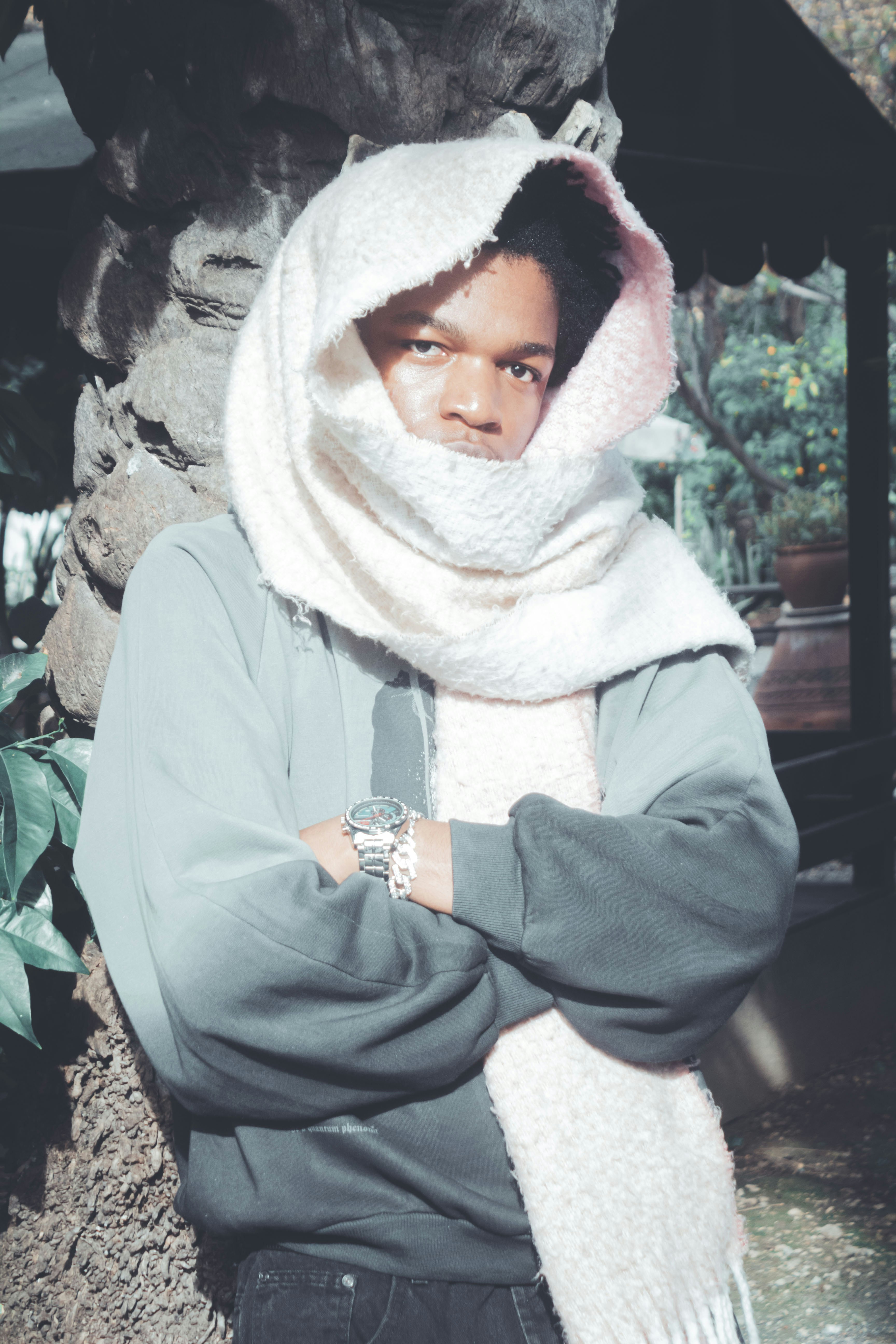 Wrapped in Warm Vibes: A Portrait Hidden Behind a Soft White Hood