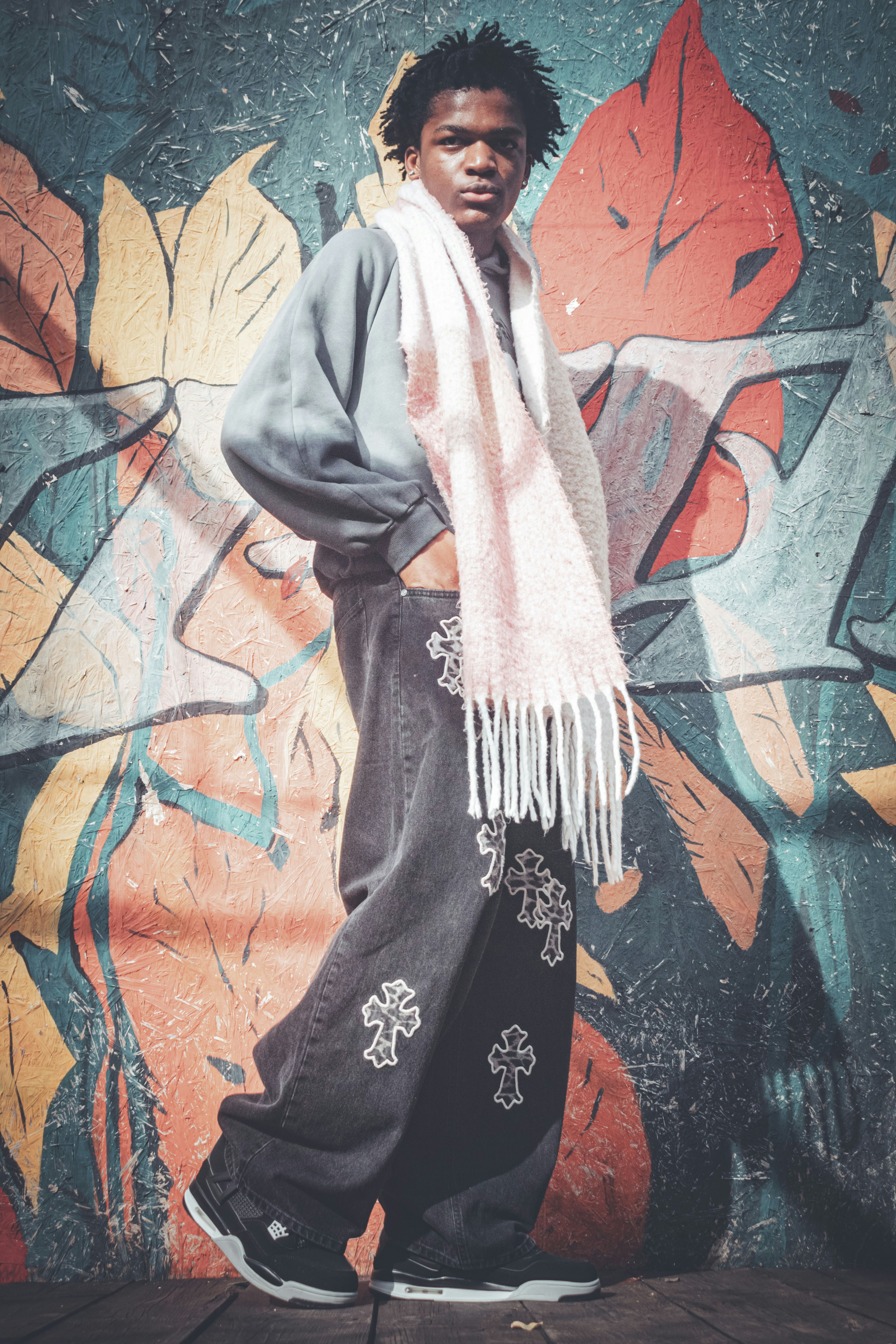 Urban Portrait in Front of Graffiti: The Quiet Confidence
