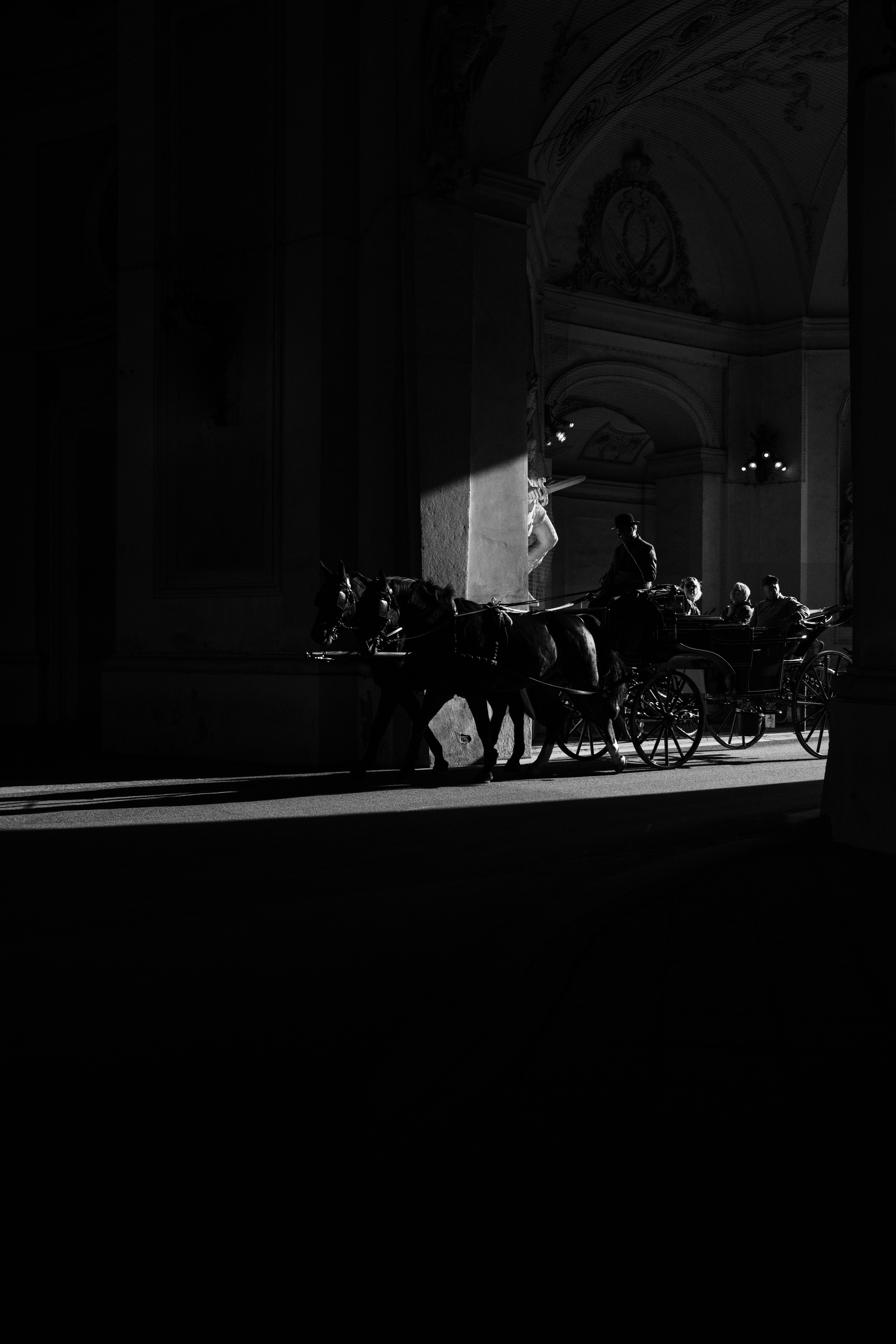 Shadowed Carriage at the Archway