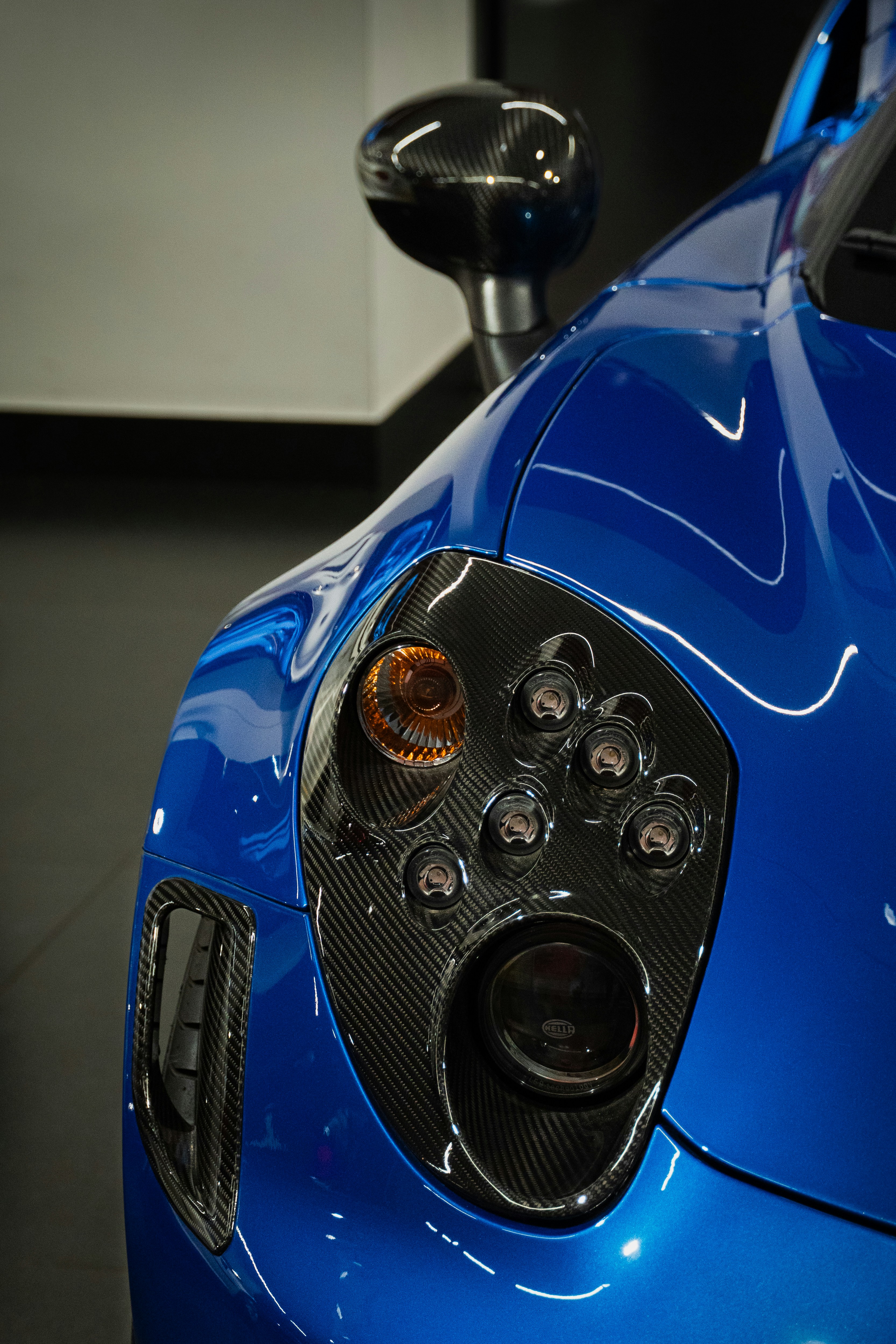 Blue Bullet: The Car’s Carbon Fiber Face and Headlight Spectrum