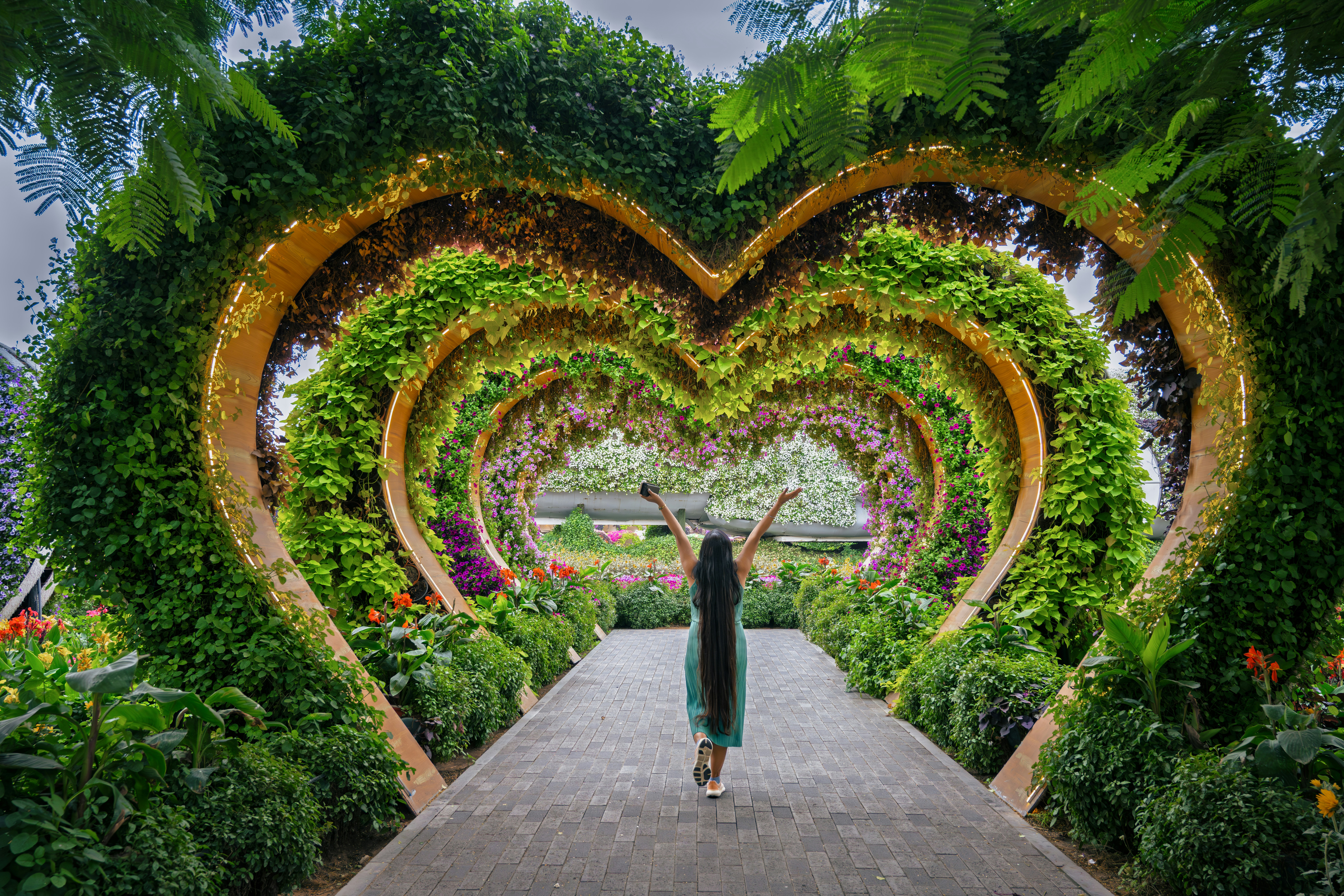 Heart of the Garden Arc: A Silhouette Reaches for the Open Gate