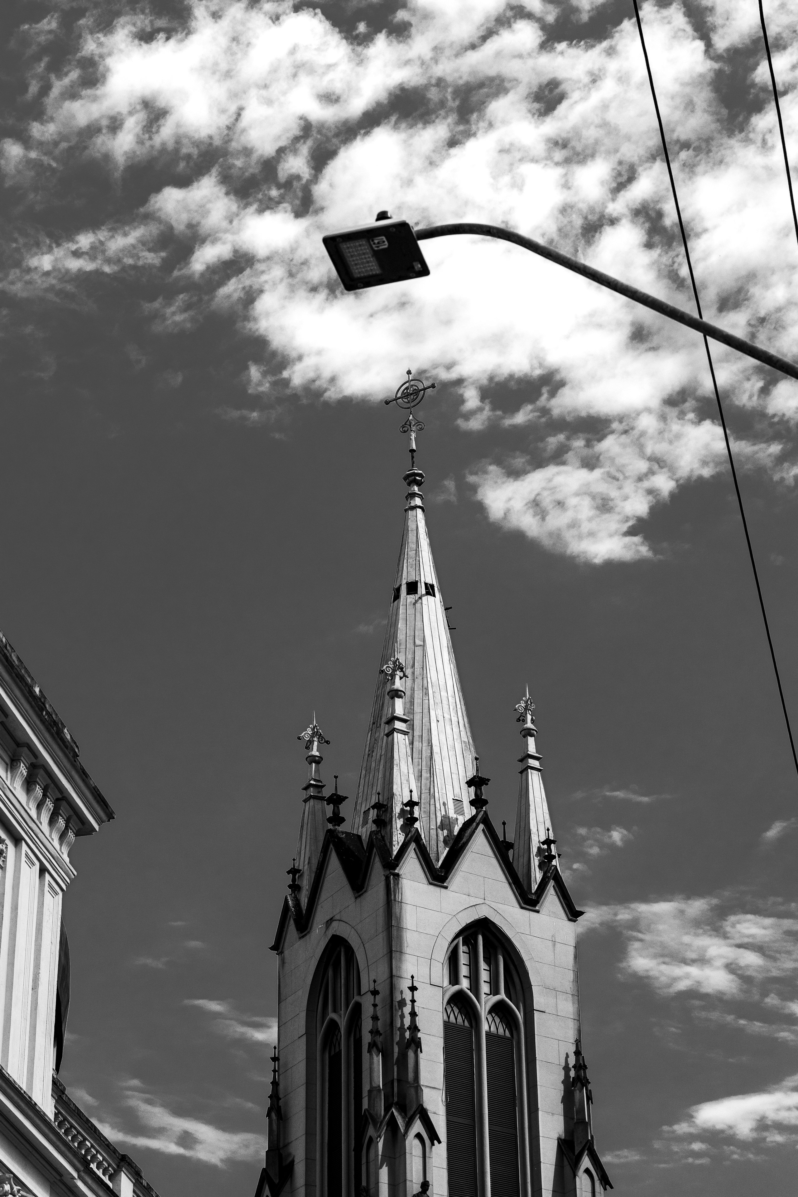 Gothic Spire Under Urban Skies