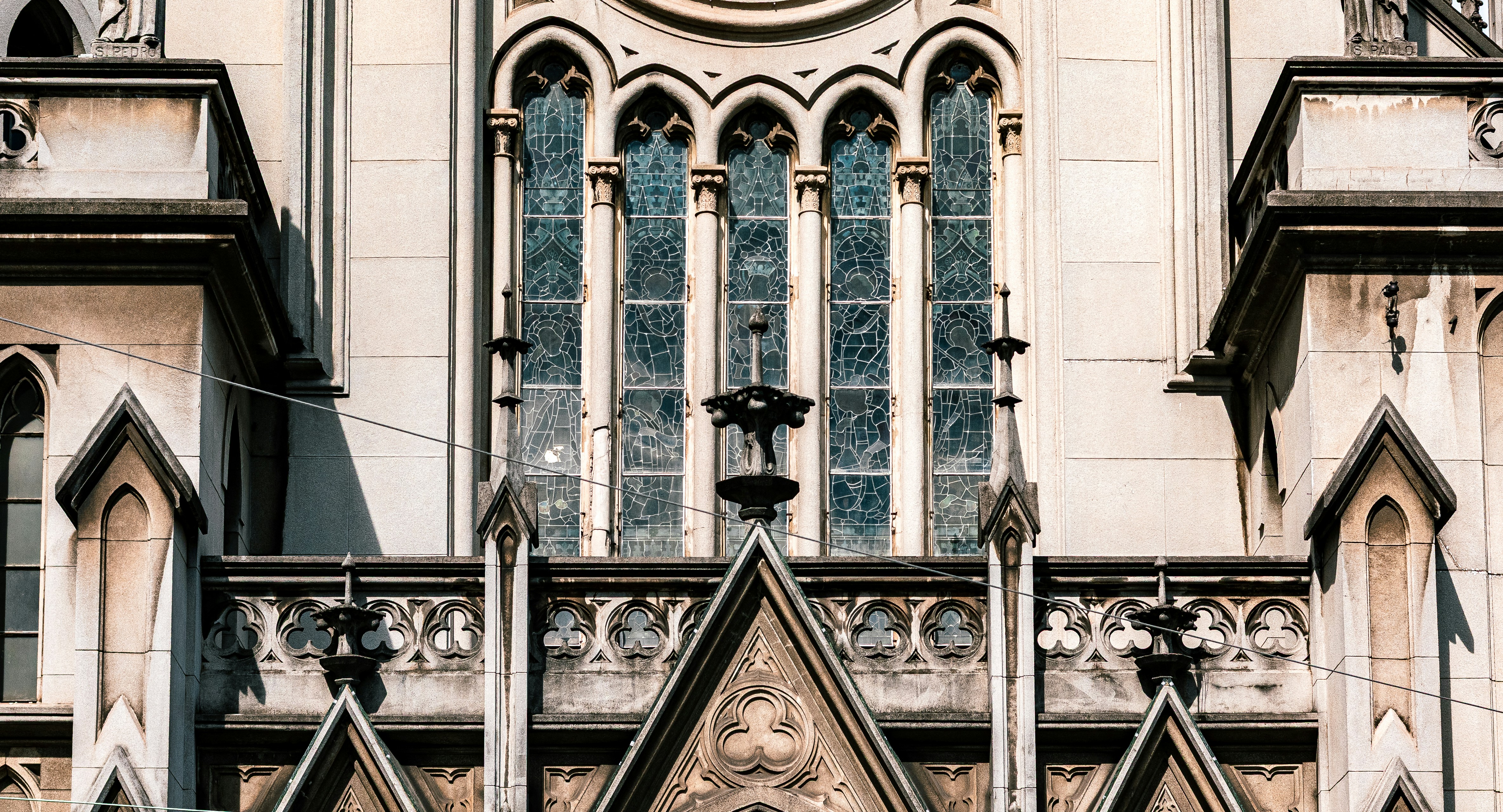 Gothic Facade Crown: Arched Windows and Ornate Spires