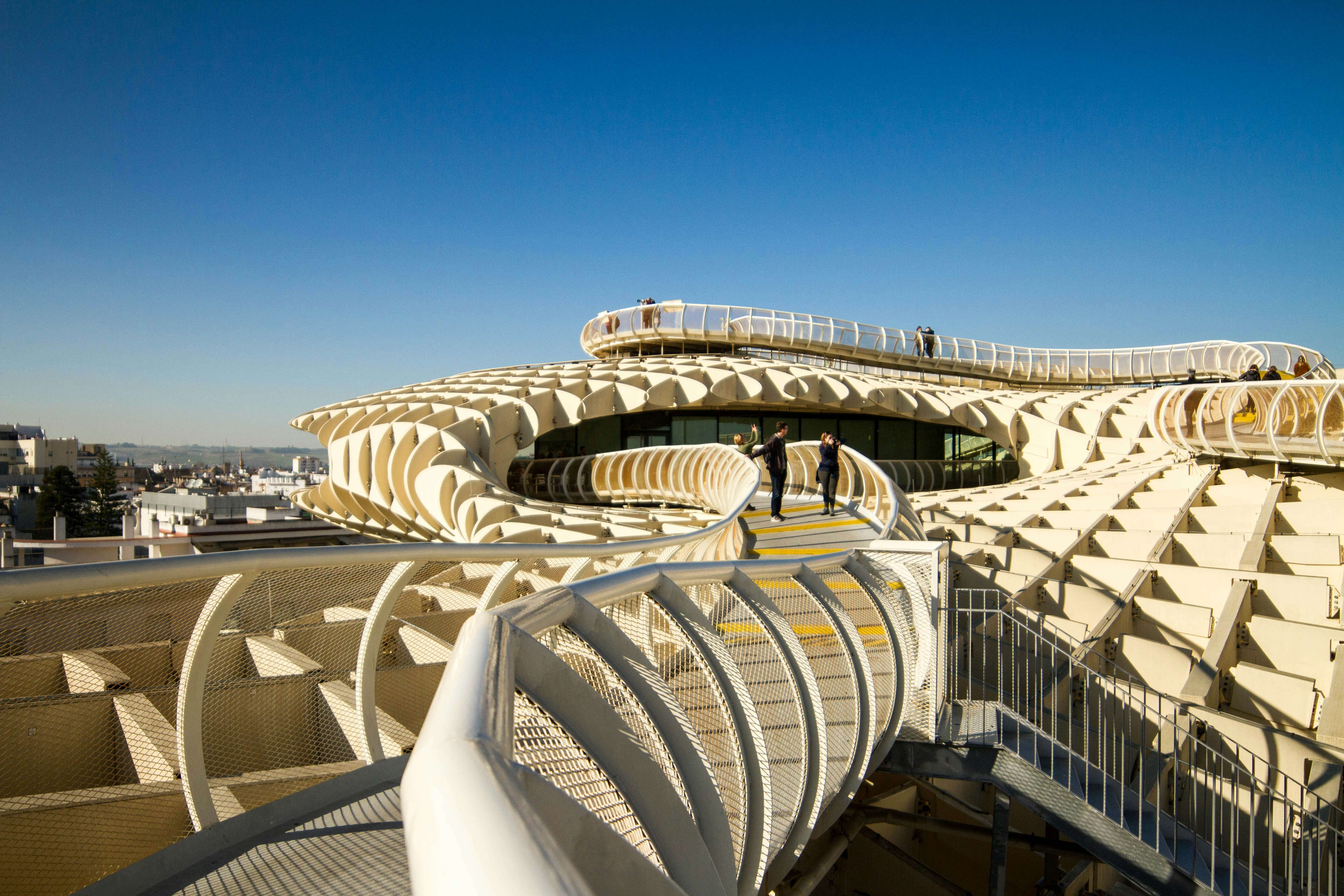 Curved Metallic Cascades: A Walk Across Barcelona's Undulating Roofscape