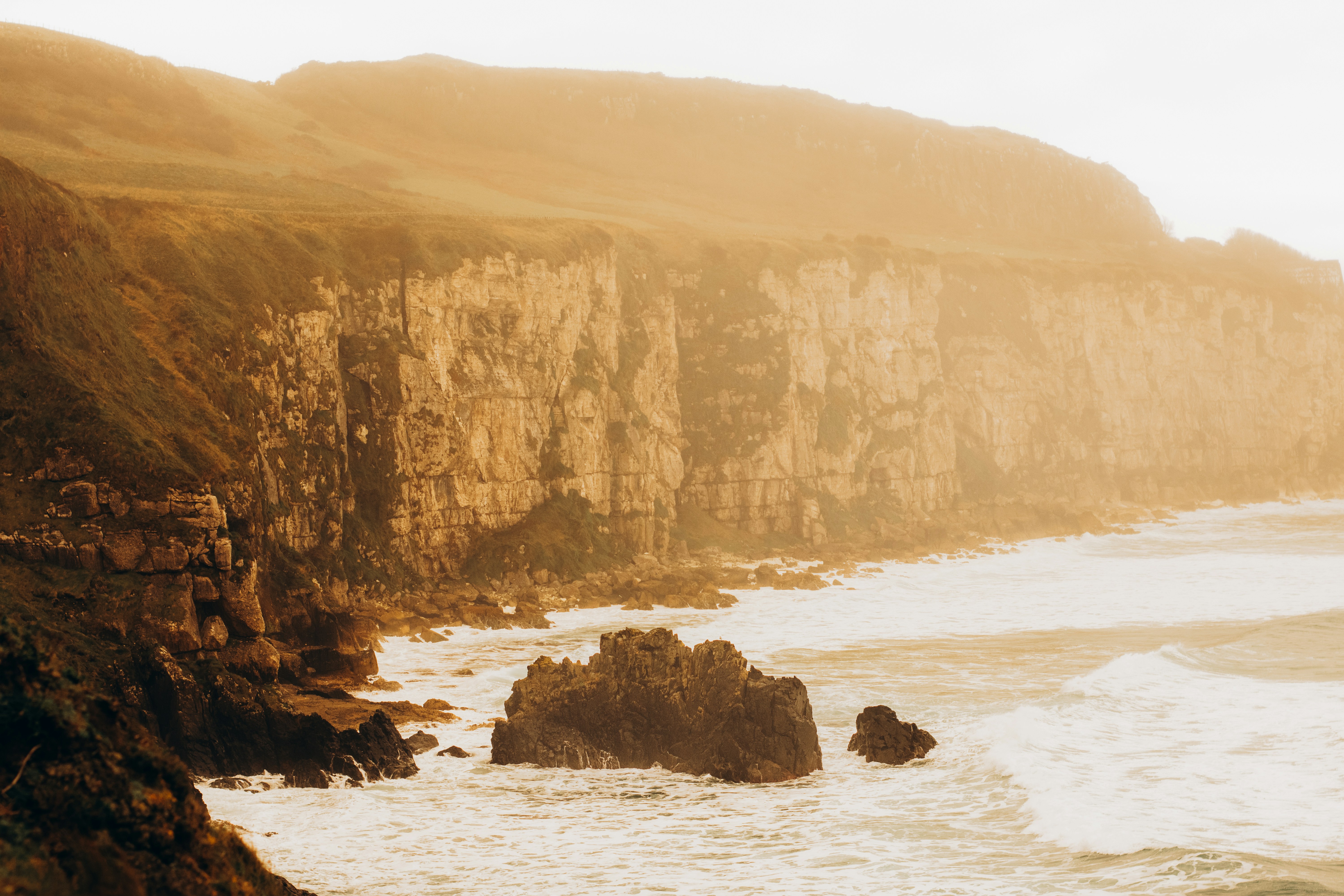 Golden Cliffs at Dusk: A Quiet Seaside Fracture