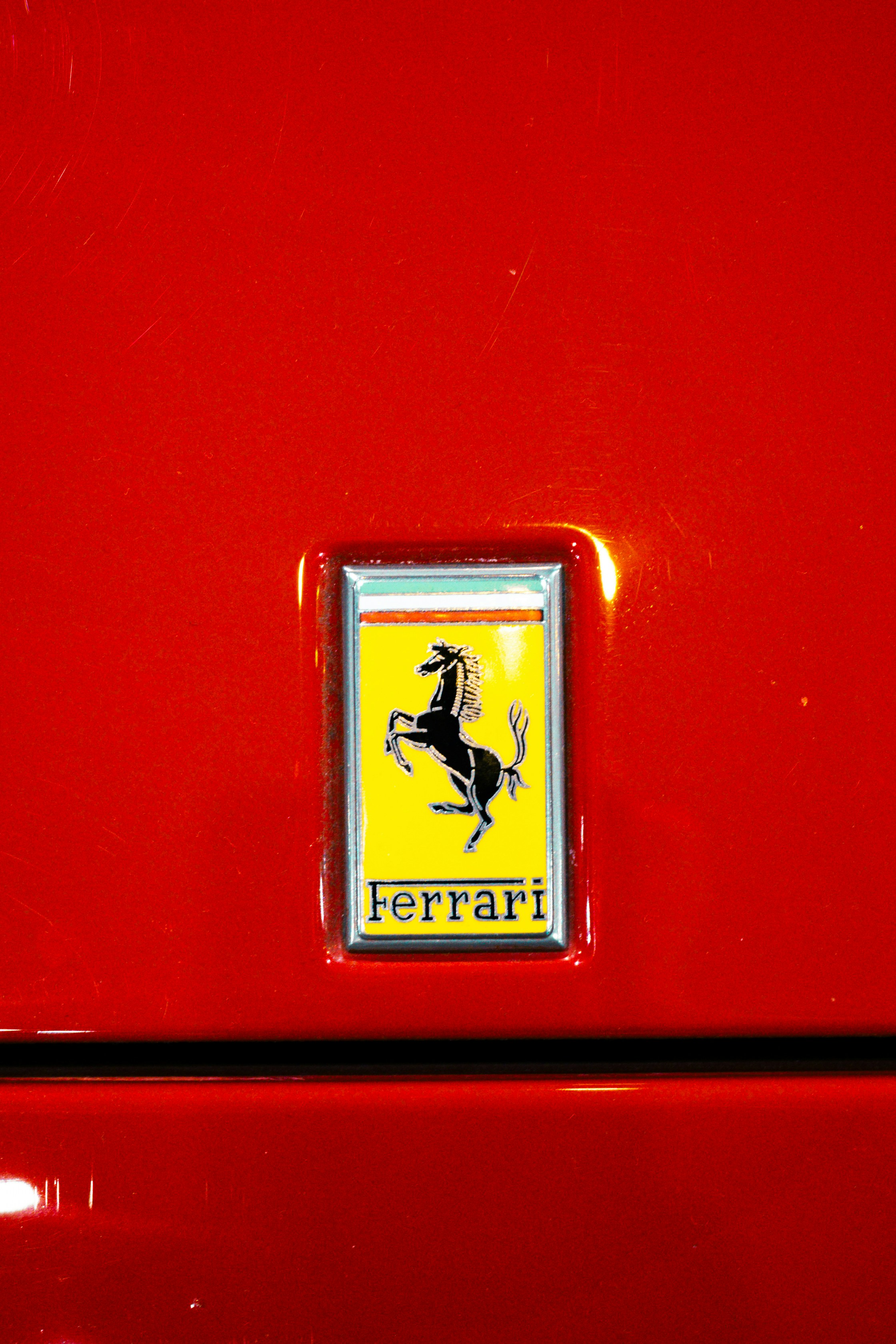 Ferrari Emblem Stretched on a Scarlet Panel