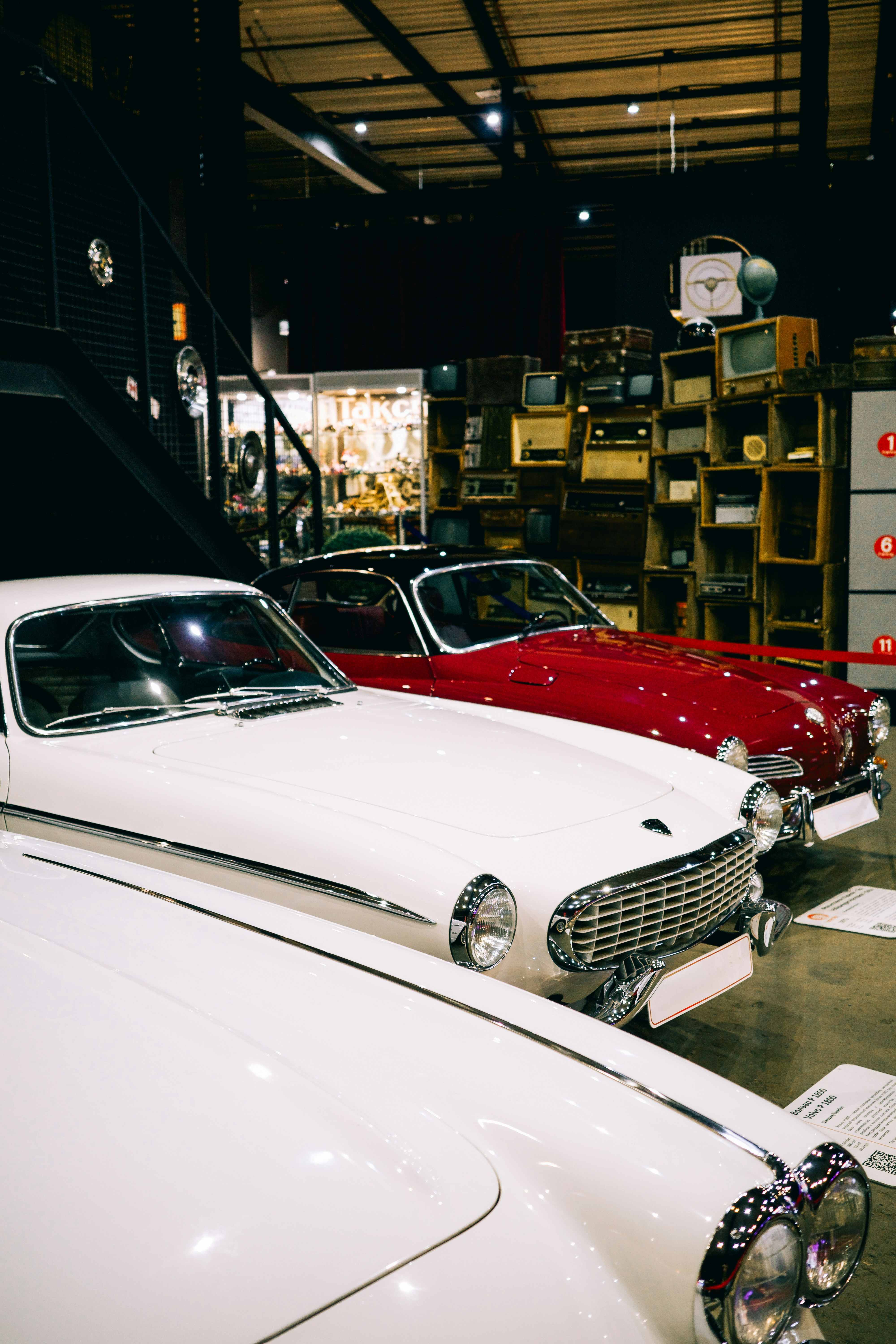 Rows of Classic Car Echoes in a Retro Exhibit