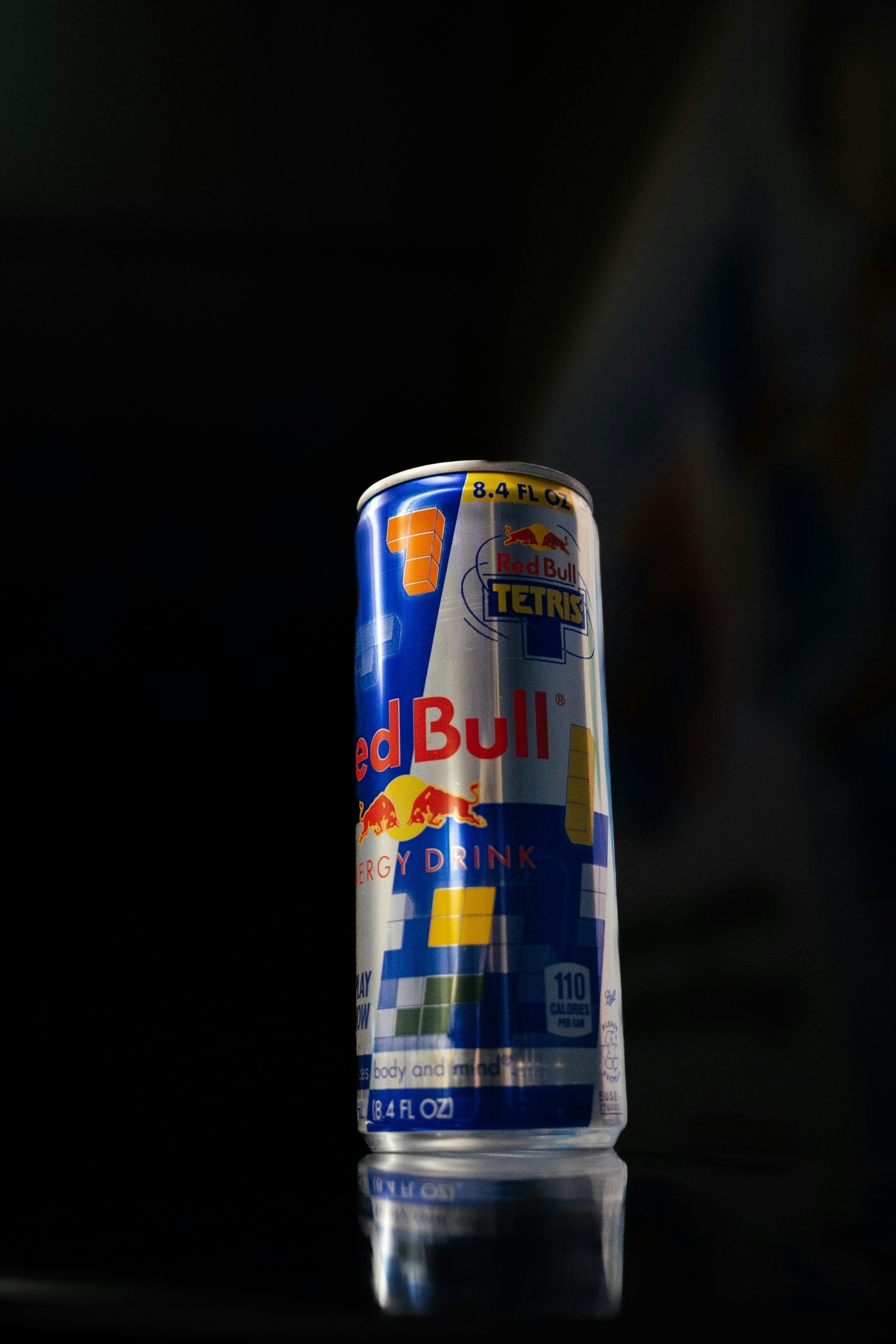 Red Bull Tetrik Can: Neon Blue Rally in a Dark Studio