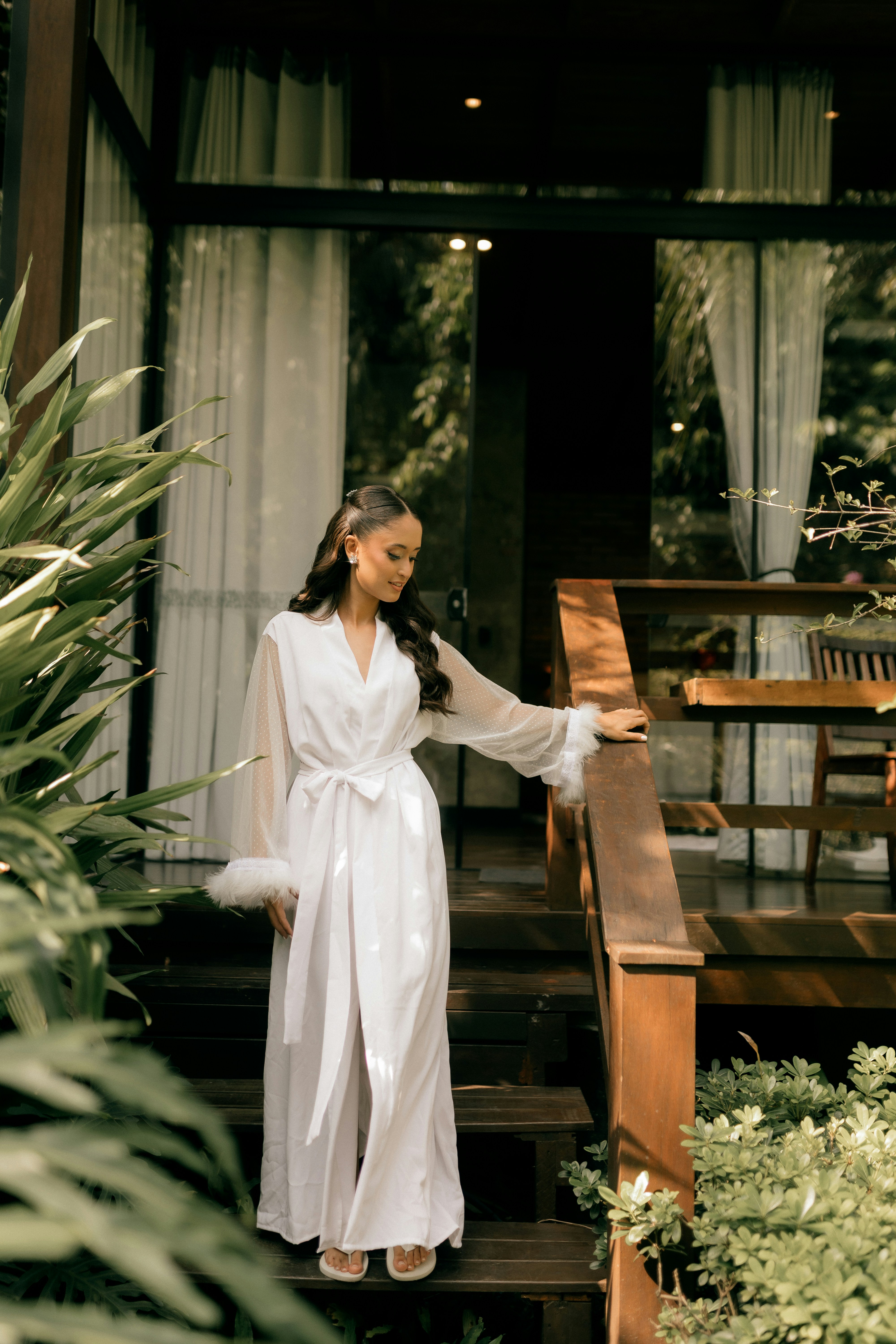 White Robe, Green Doorstep: A Quiet Portrait on the Porch