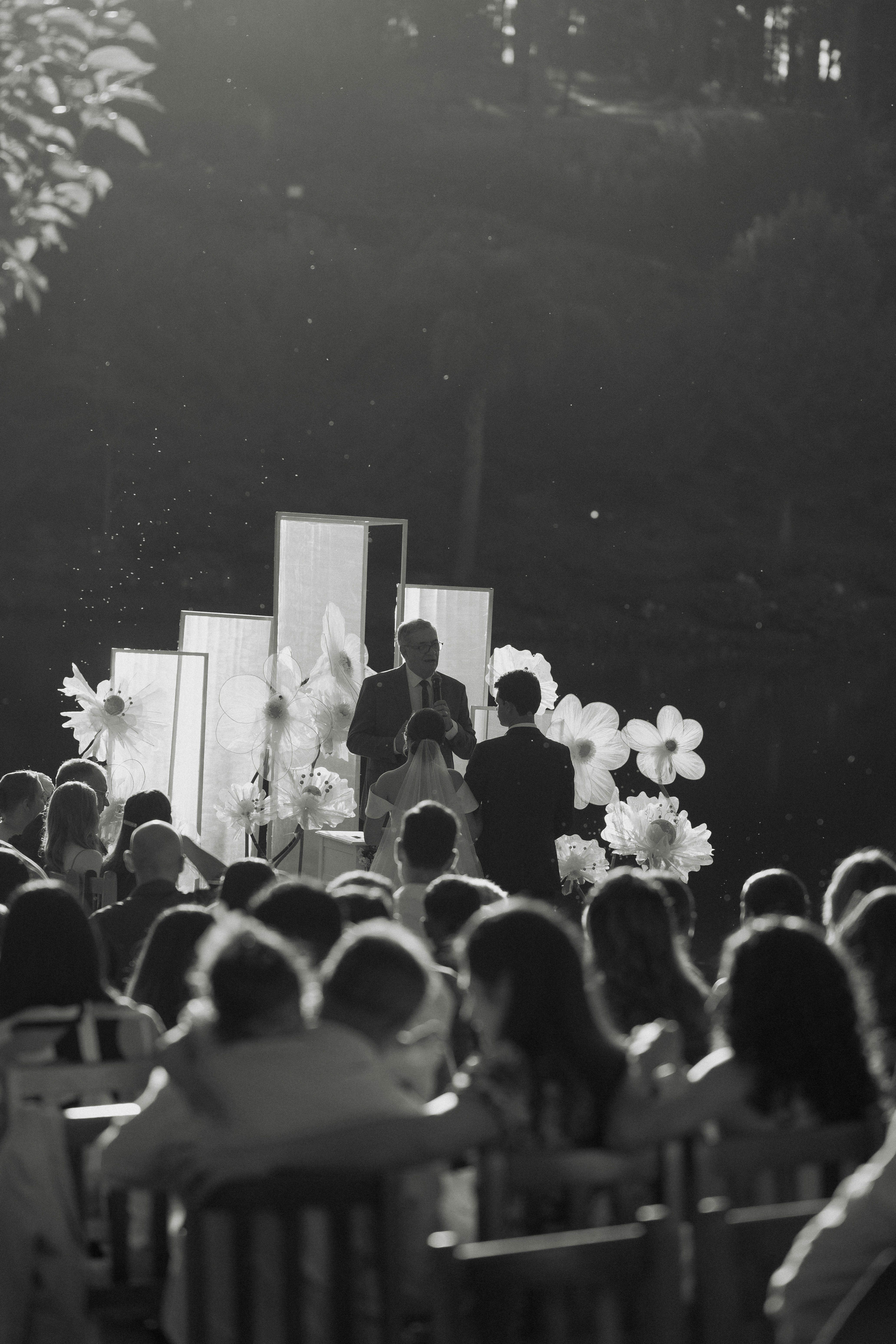The Ceremony Amidst Paper-Flowers: A Monochrome Moment