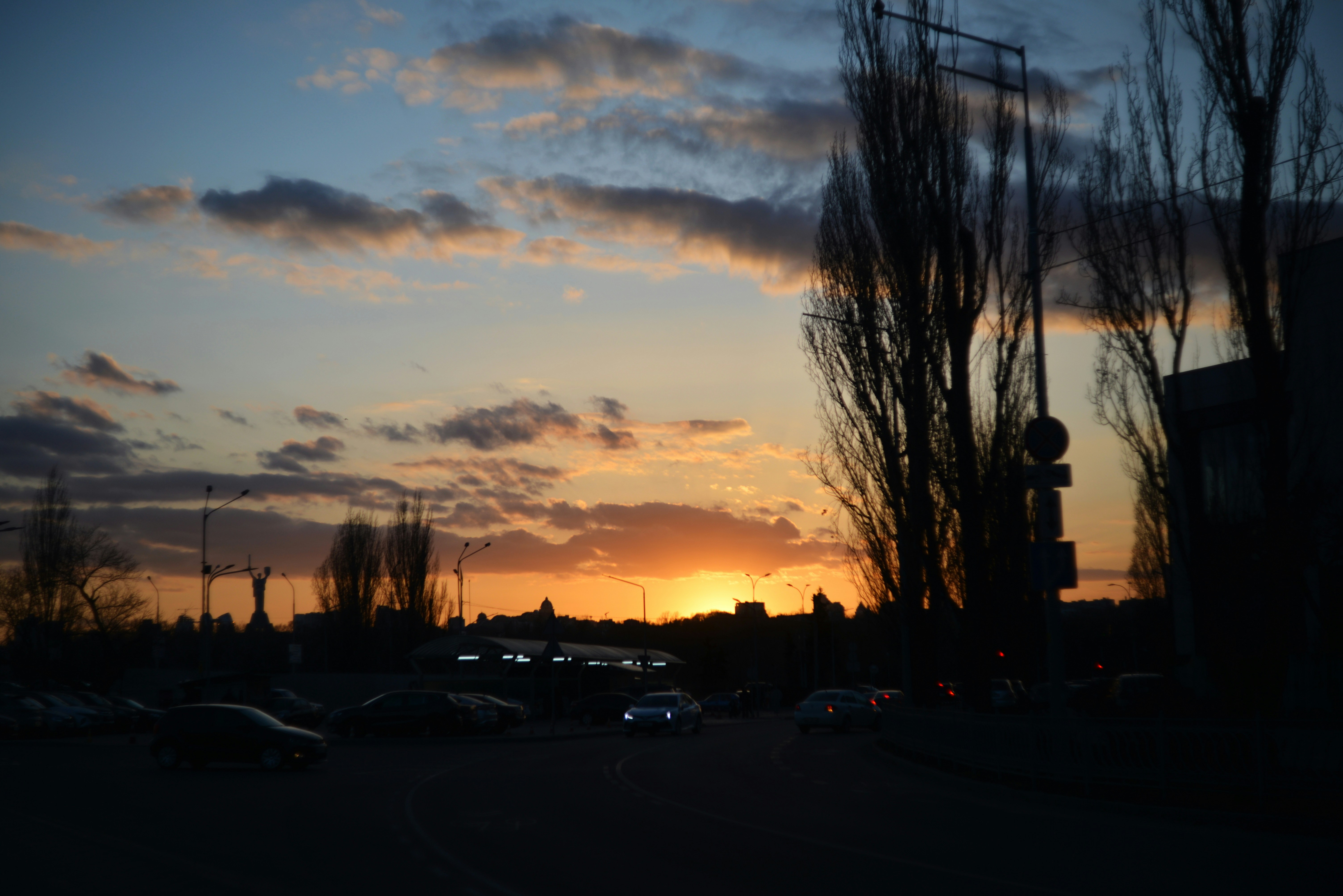 Dusk Convergence Over a Calm City Street