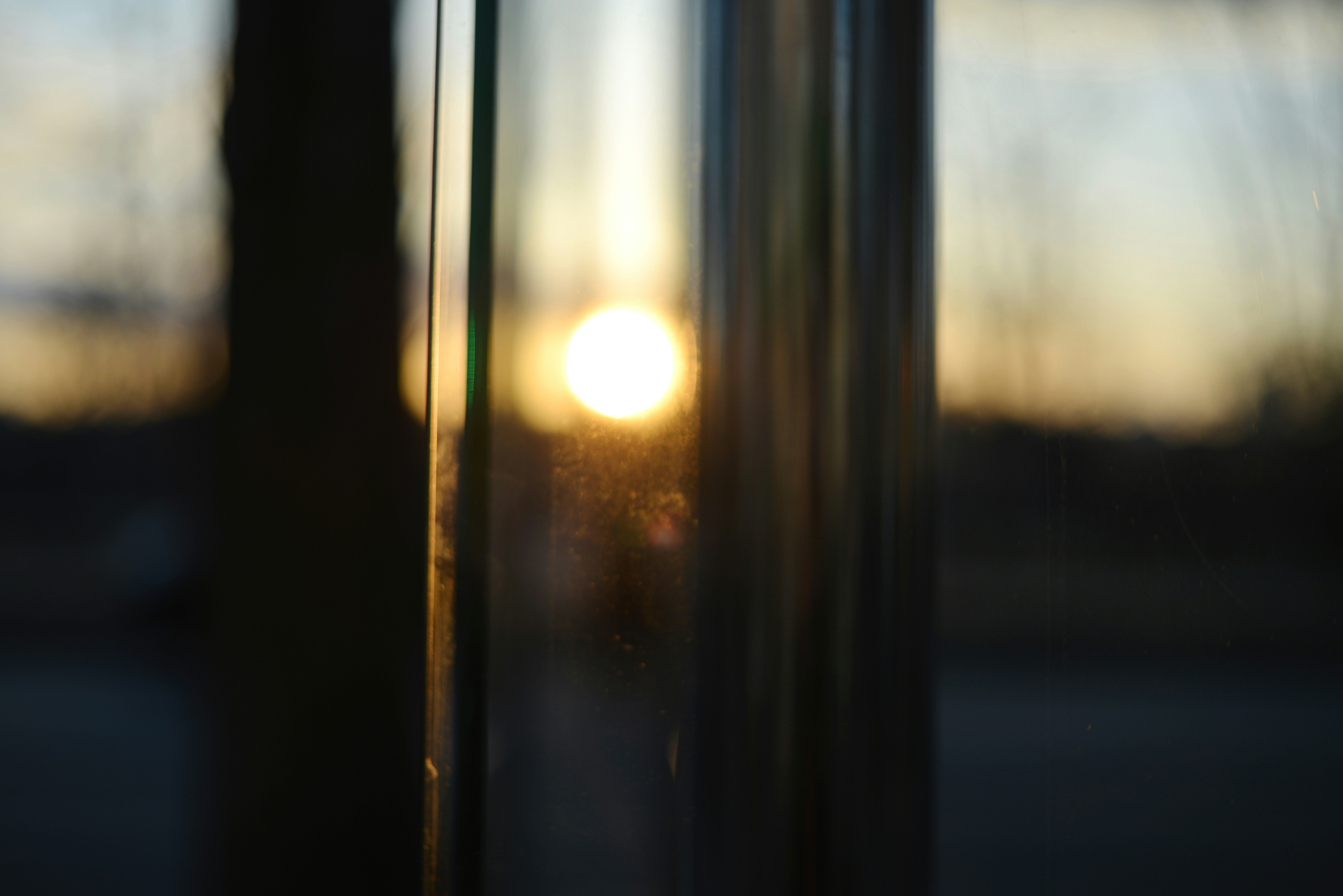 Sunlit Glass Between Shadows