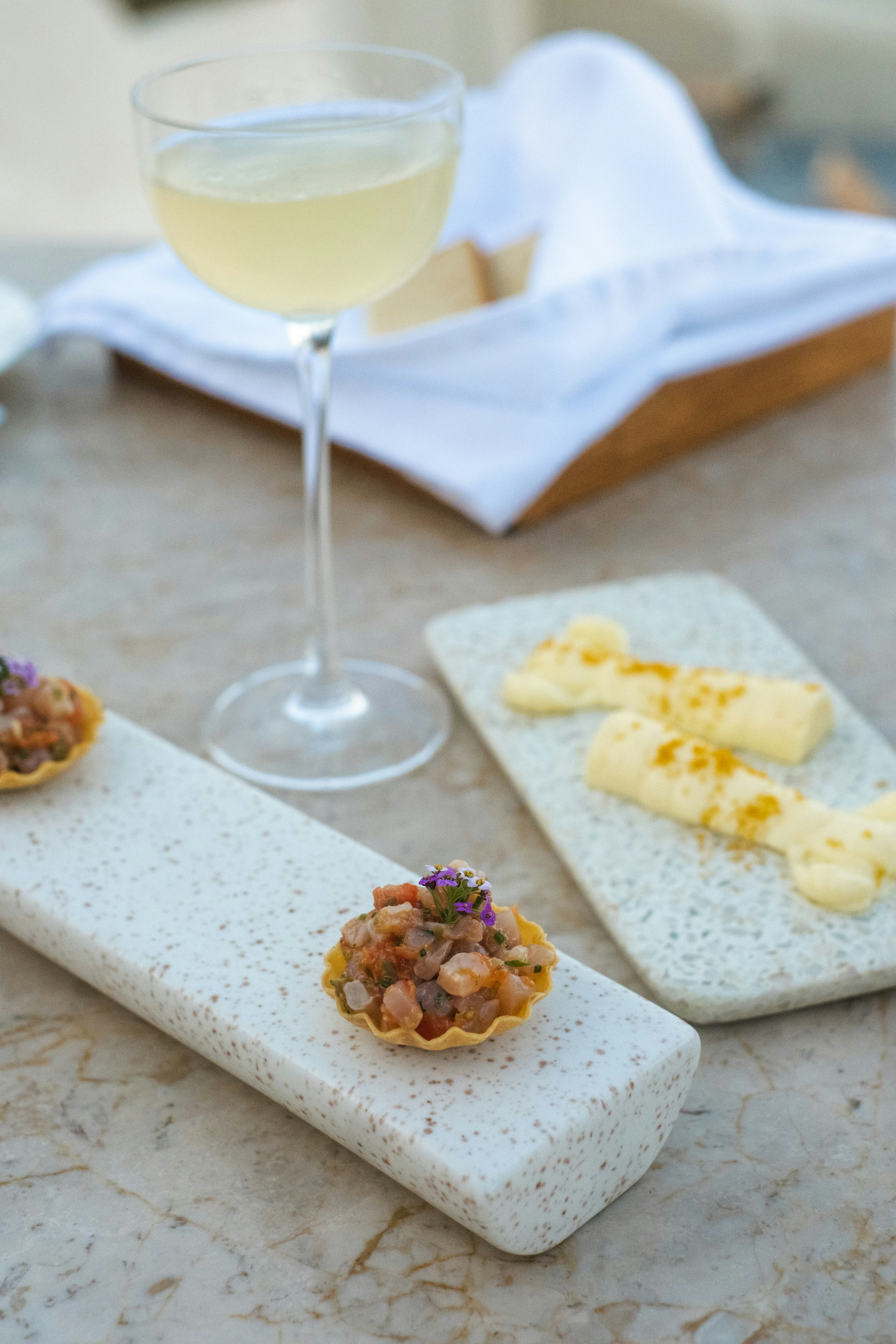 Elegant nibble and a glass of white: a refined patio moment