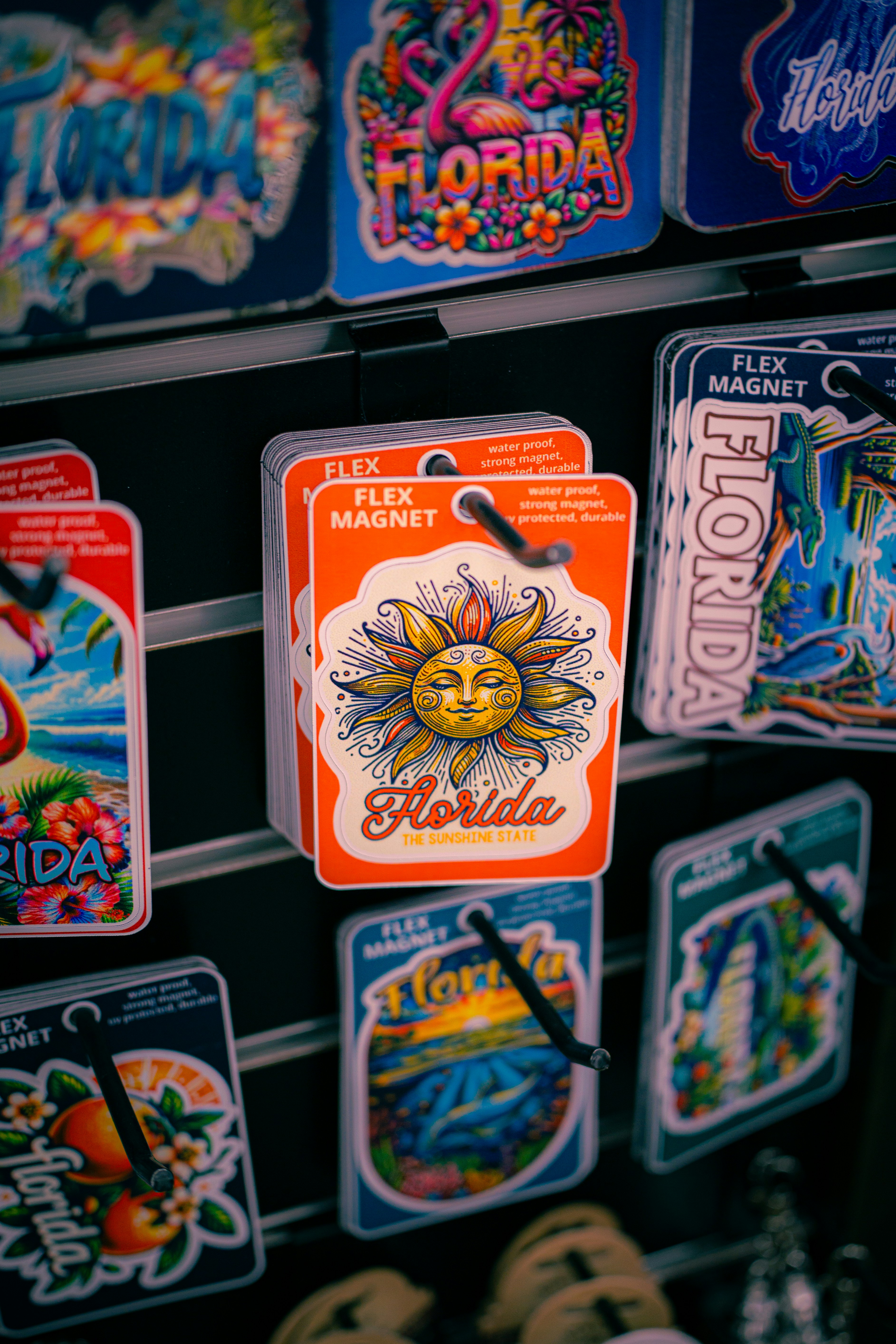 Sunlit Florida Magnet: A Bold Orange Card with a Radiant Sun Emblem
