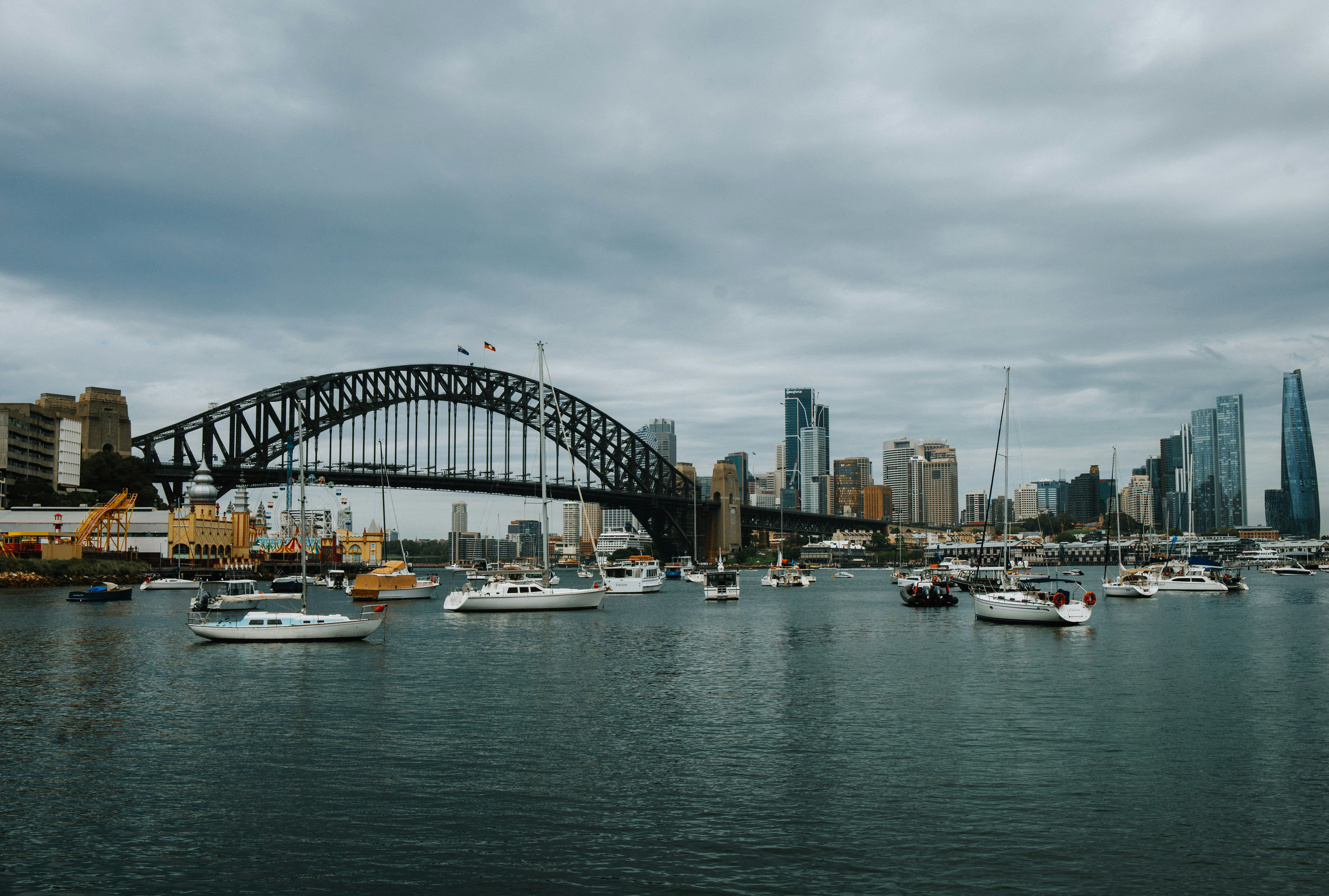 Harbor Horizon: Boats at the Sydney–style Bridge and Skyline