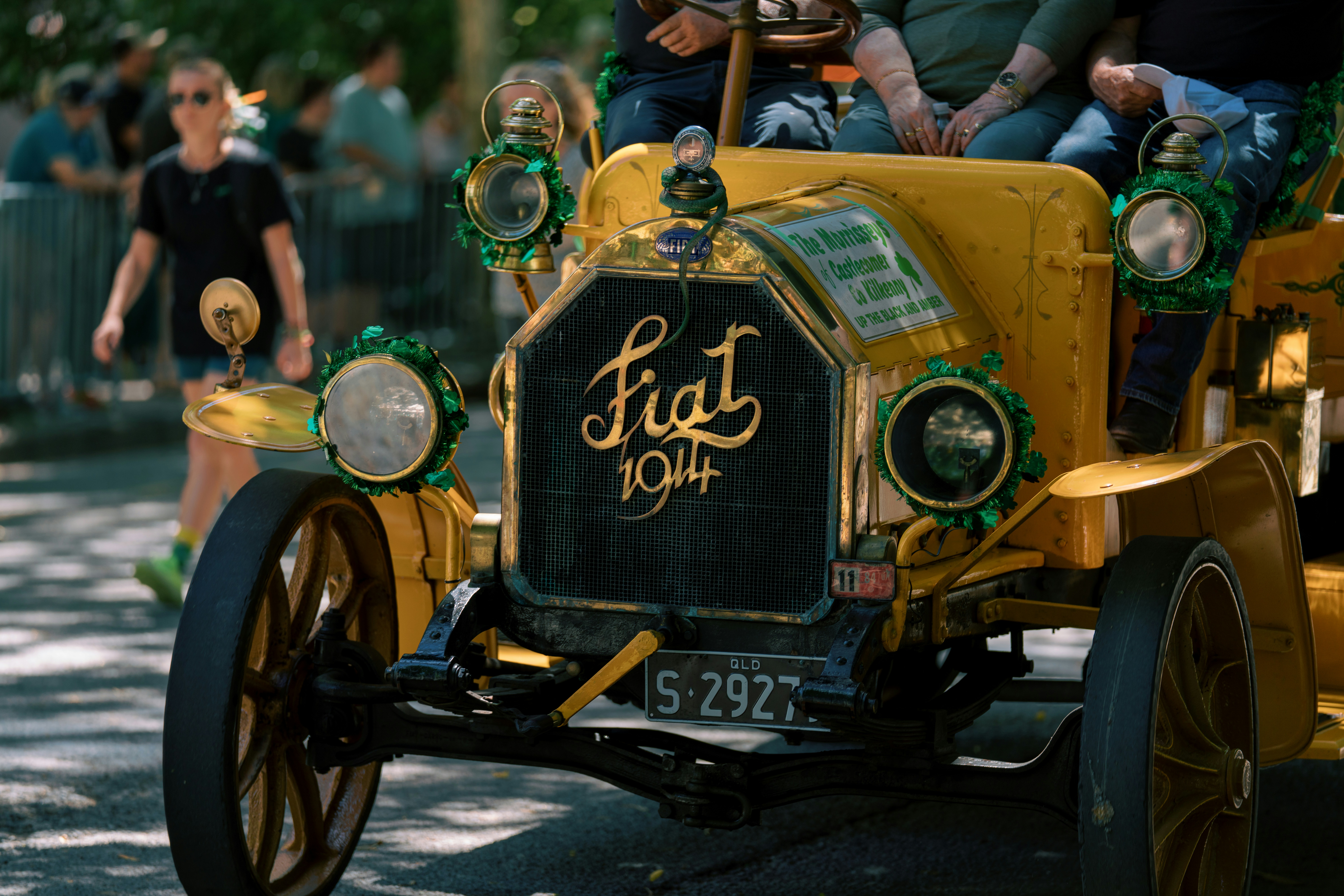 Sunlit Vintage Fiat: A Glowing Citizen in Golden Attire