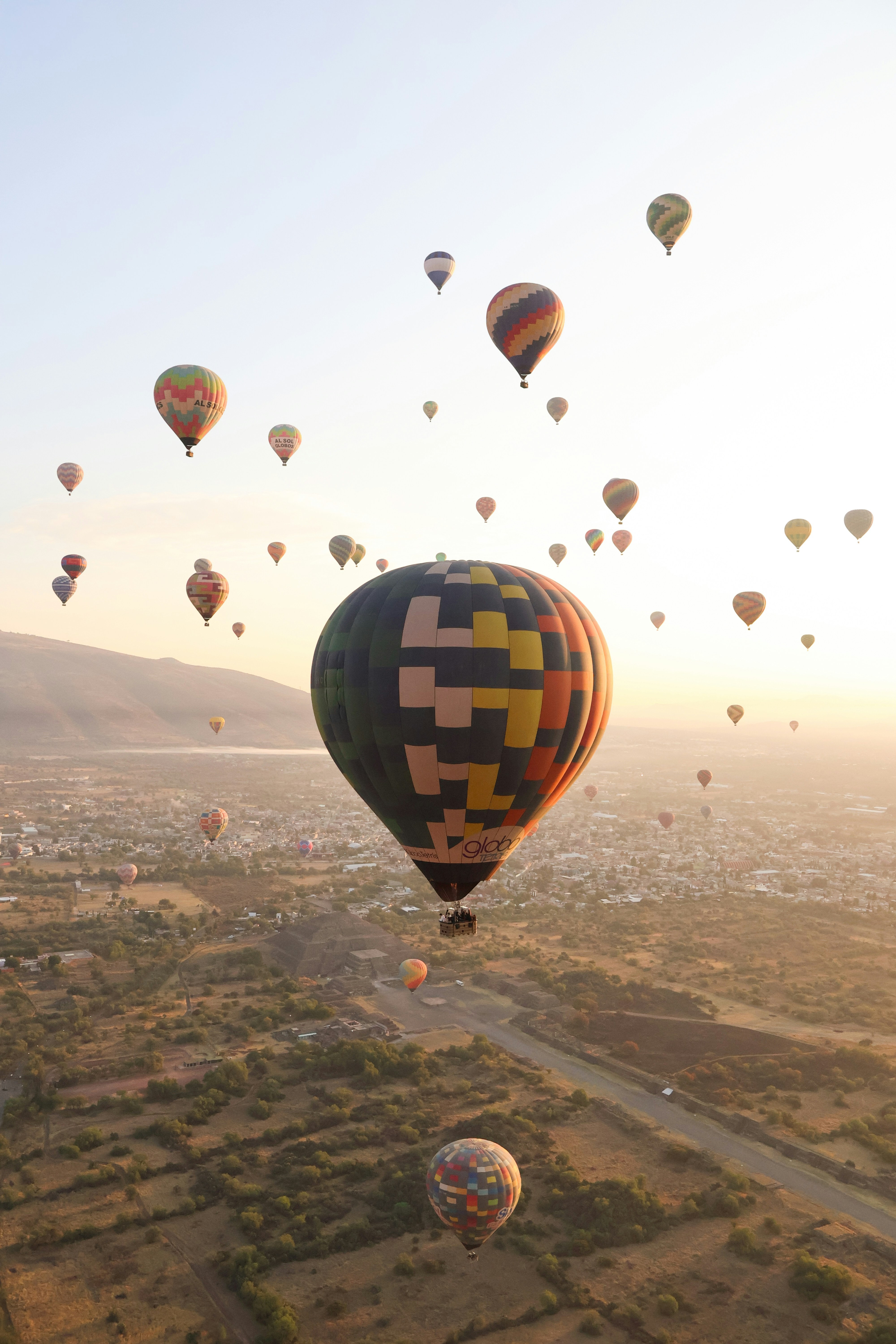 Skyfall over the Valley: Aerial Parade of Balloons