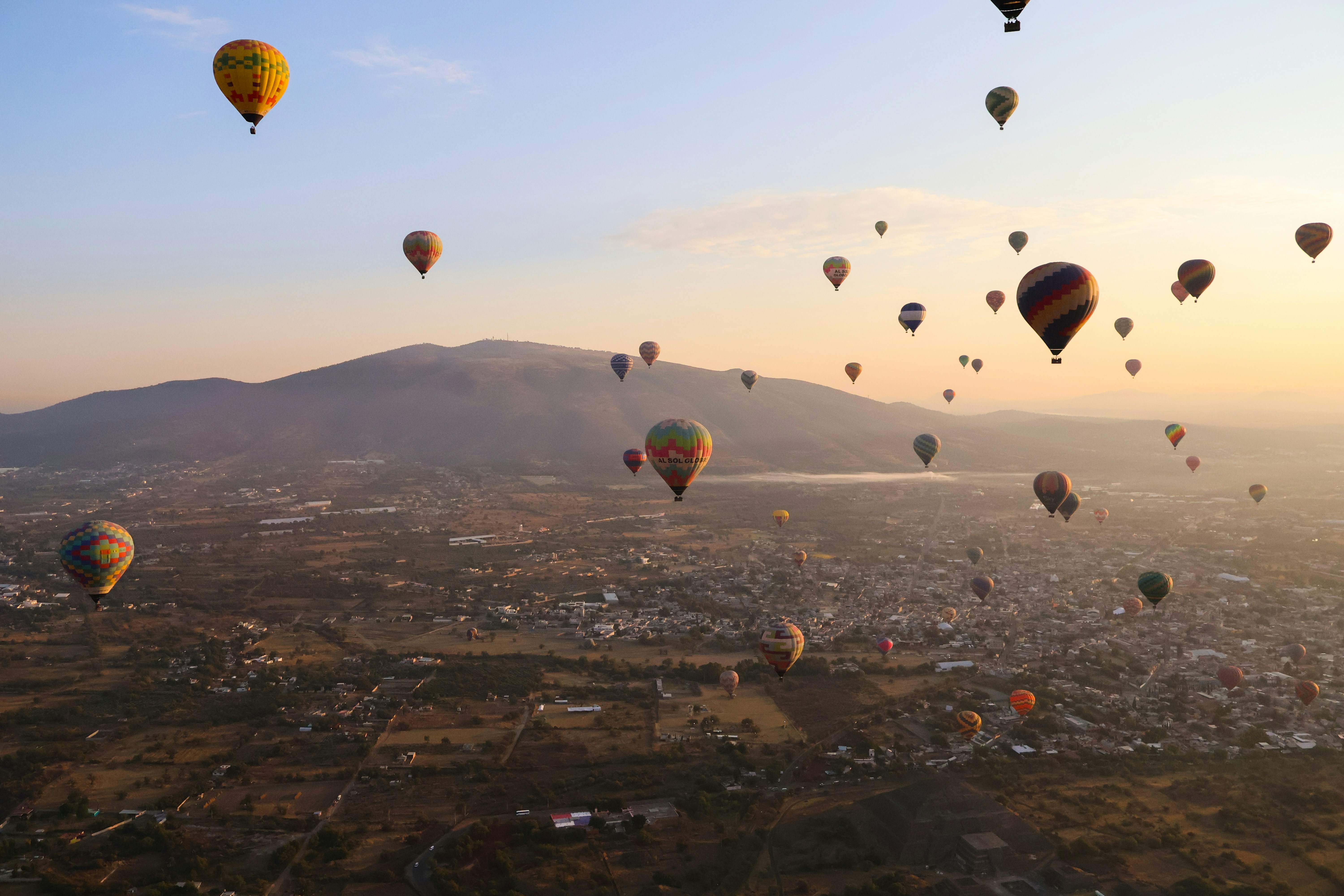Morning Parade of Balloons Over the Valley