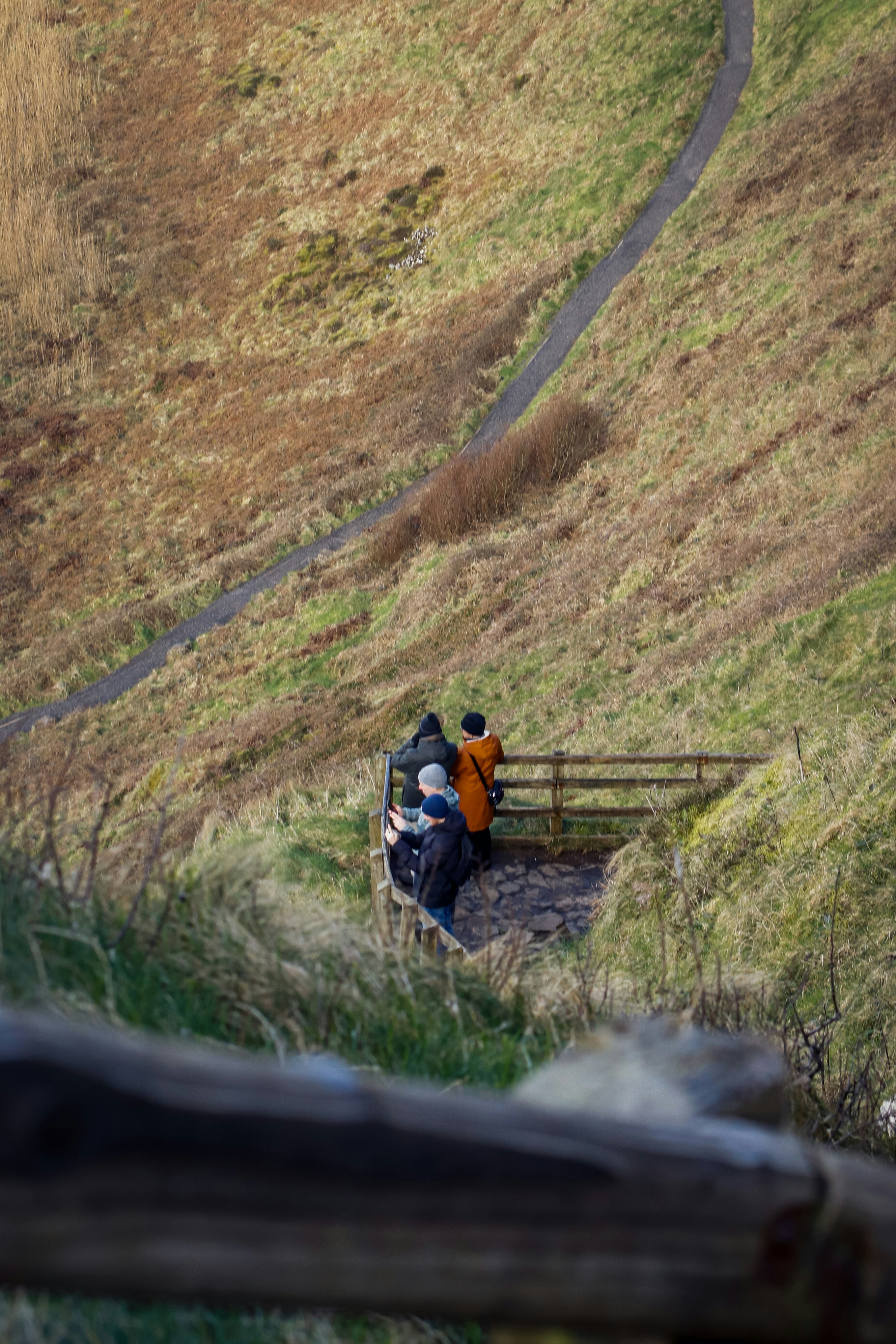 Hikers on a Slope: A Quiet Turnaround at the Ridge Path
