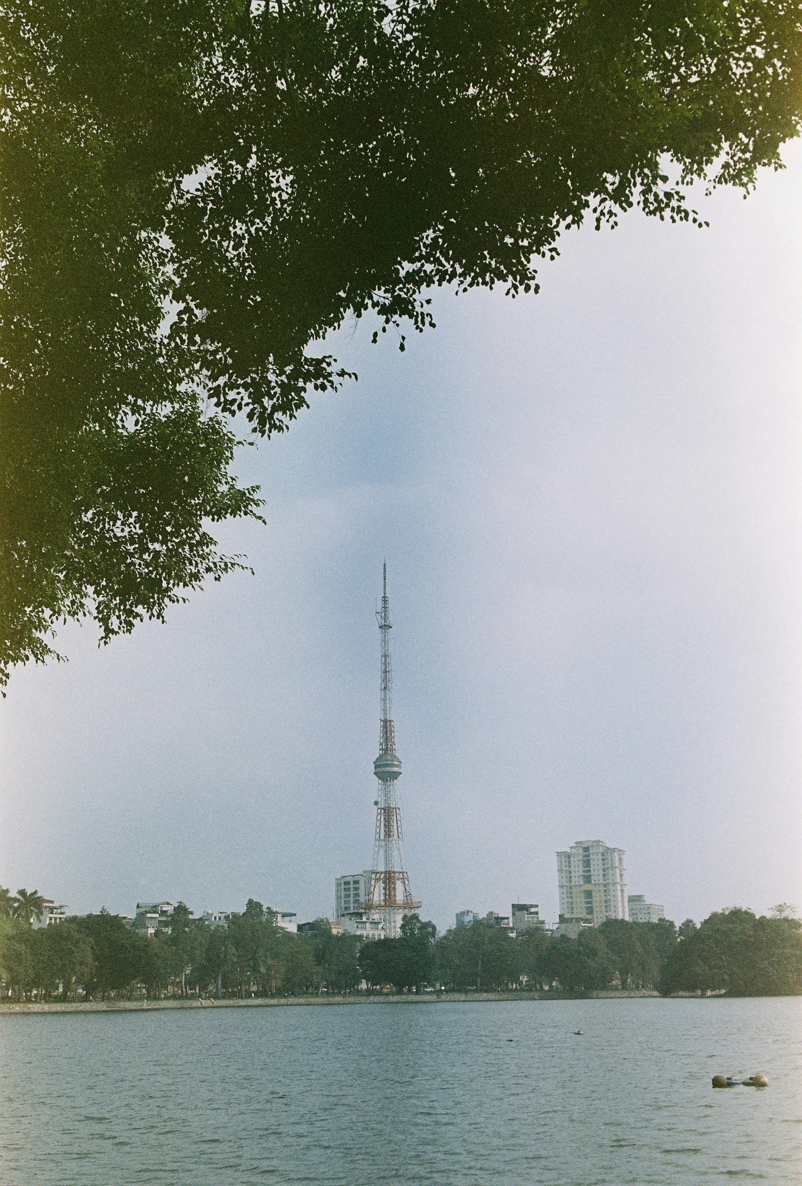 City Skyline Silhouette Across a Serene Reservoir