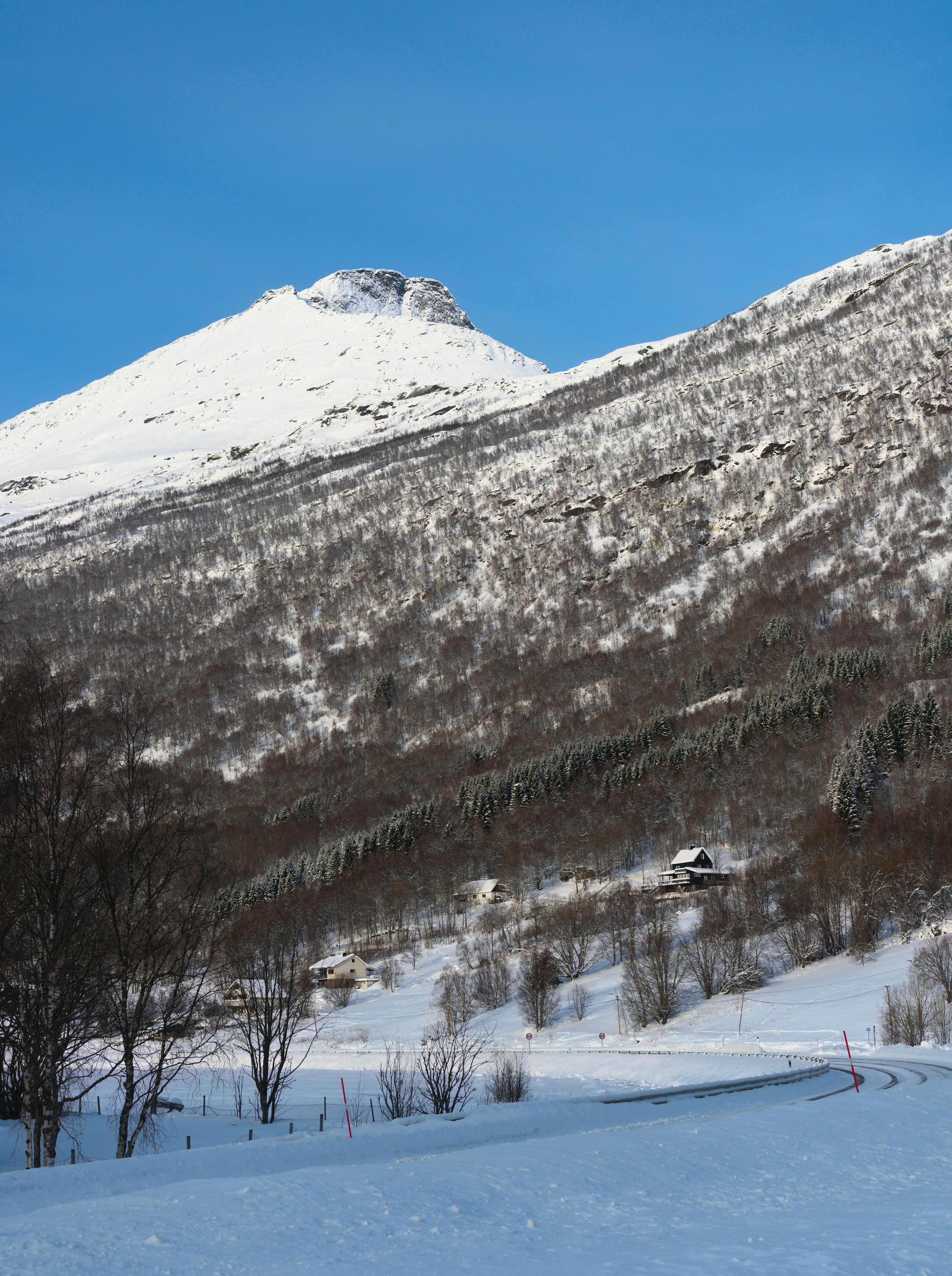 Snowbound Peak Overlook with Foaming Ridge and Village Below