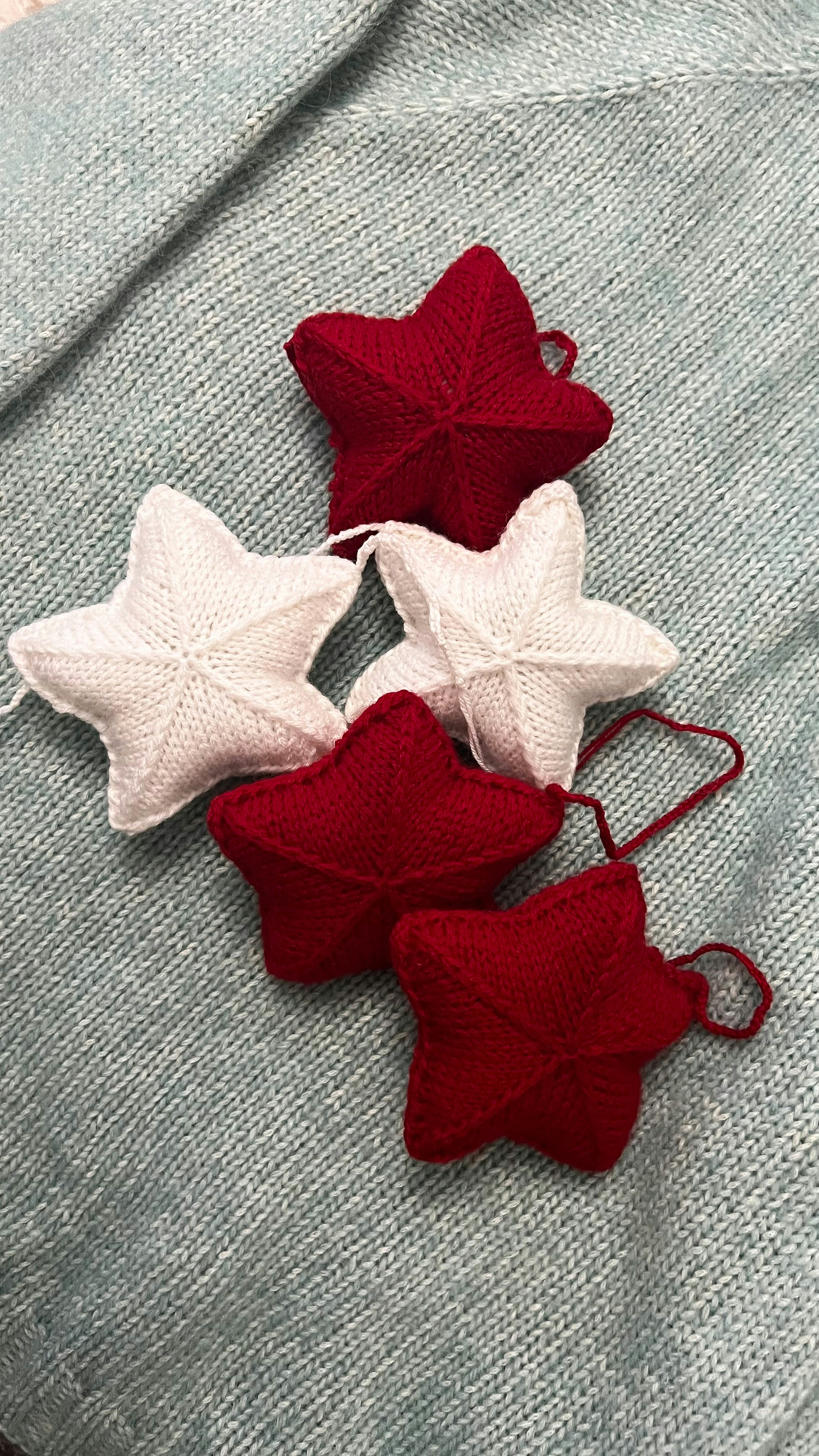 Red and White Star Ornaments on Soft Denim