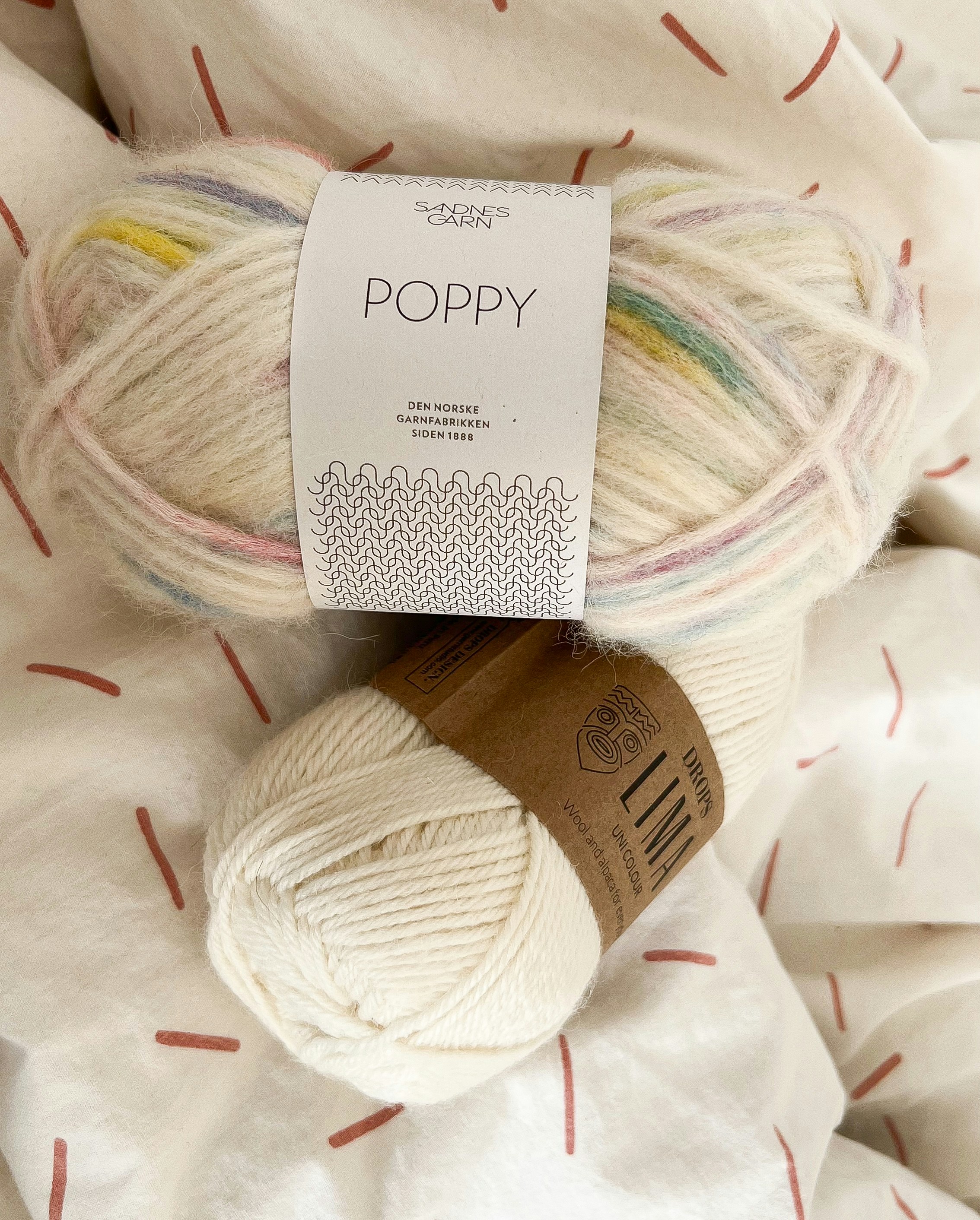 Pompom of Pile: White Skeins and Multicolor Yarn Label Centerpiece