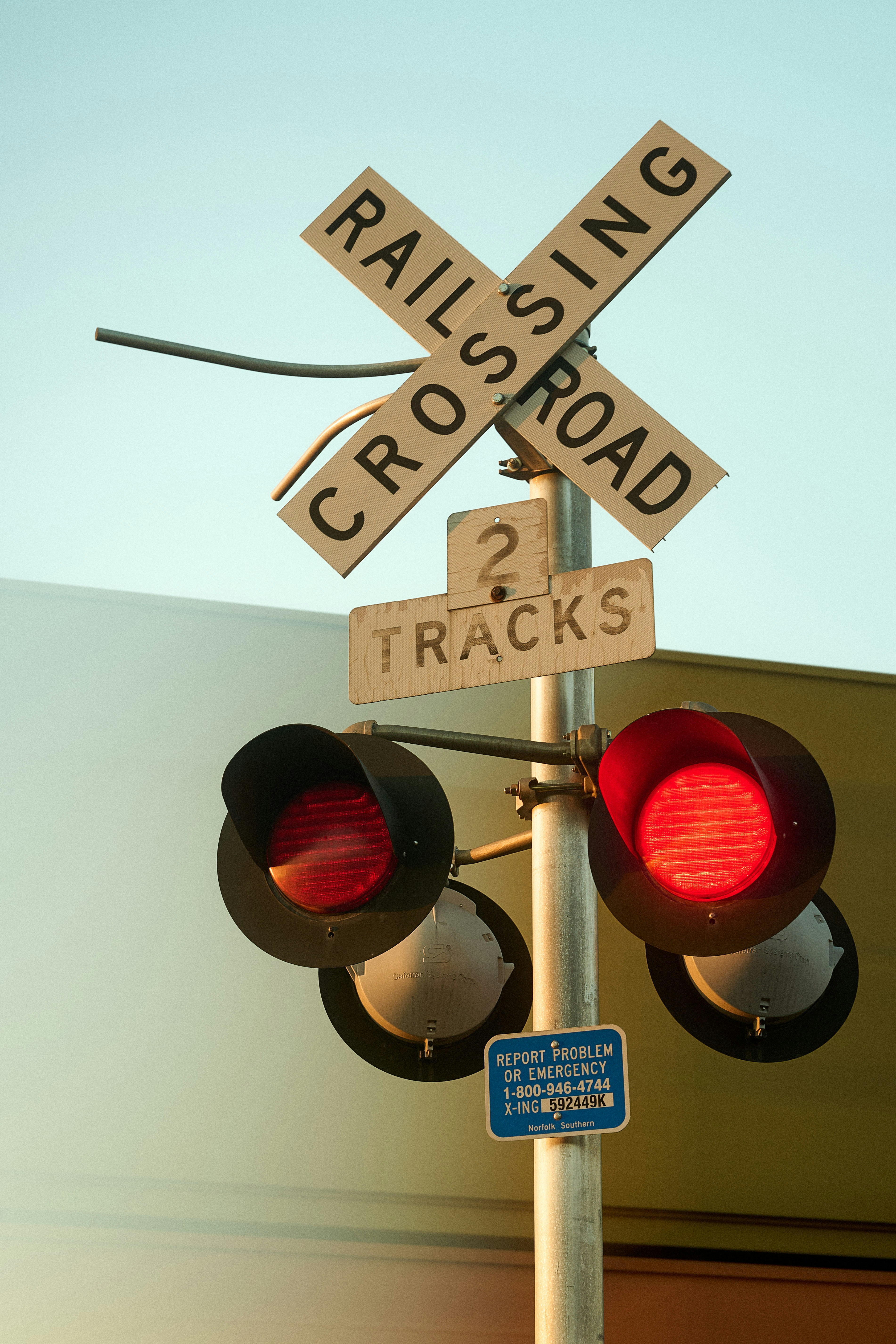 Crossing Signals: A Quiet Moment Beneath the Rails