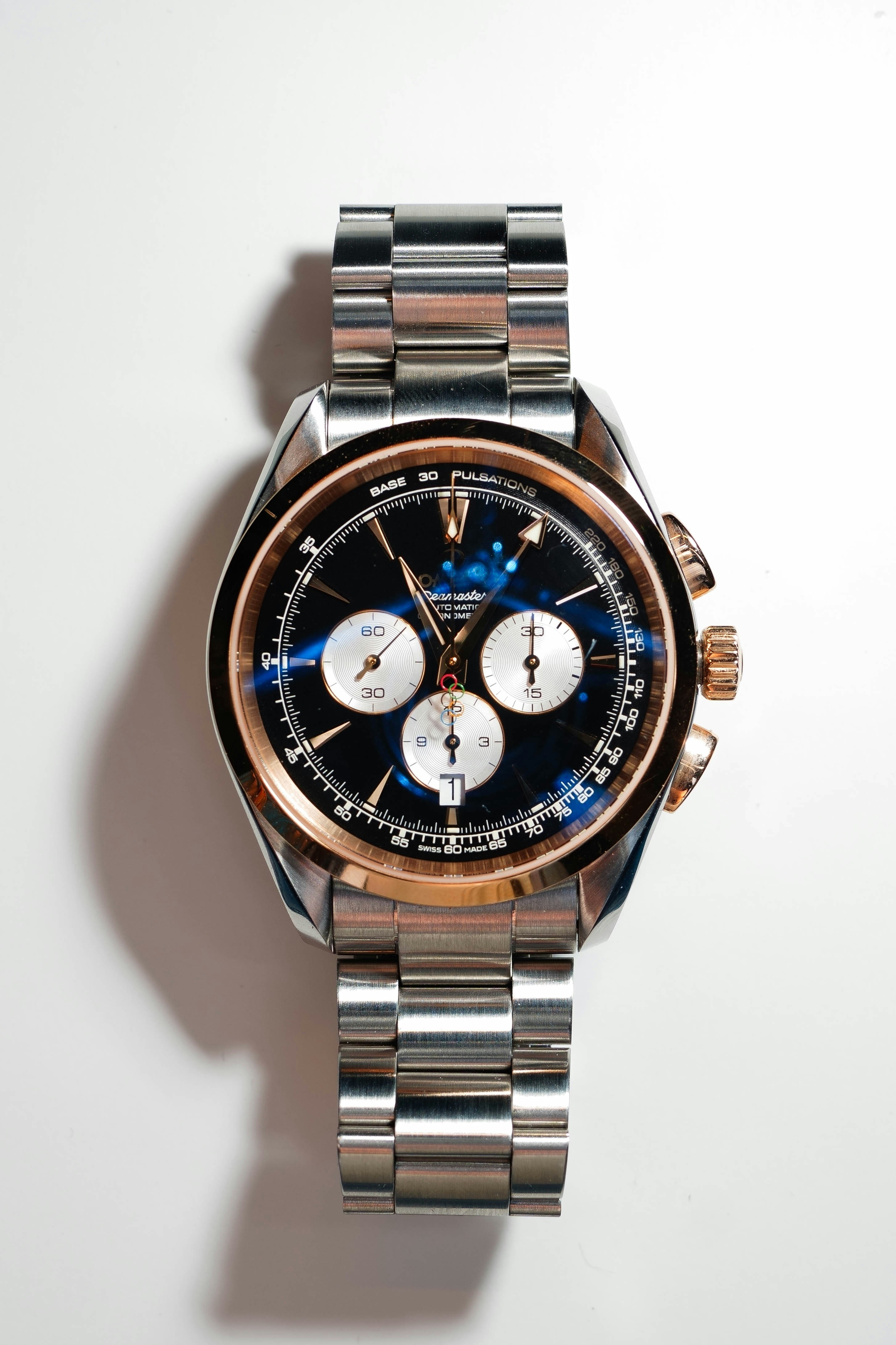 Stainless Pulse: A Classic Chronograph on a White Backdrop