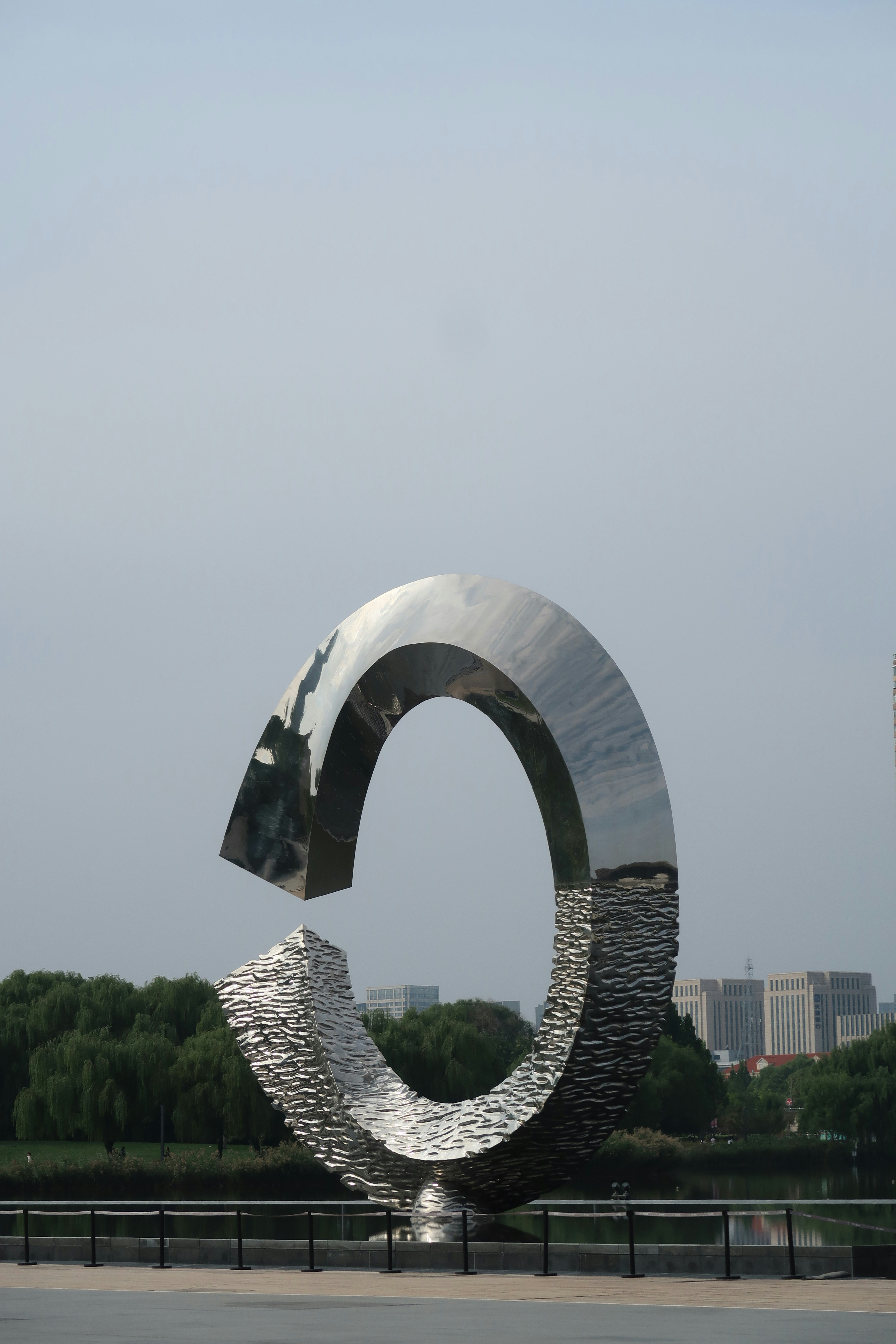 A Shimmering Arc of Steel Rising from the Riverbank