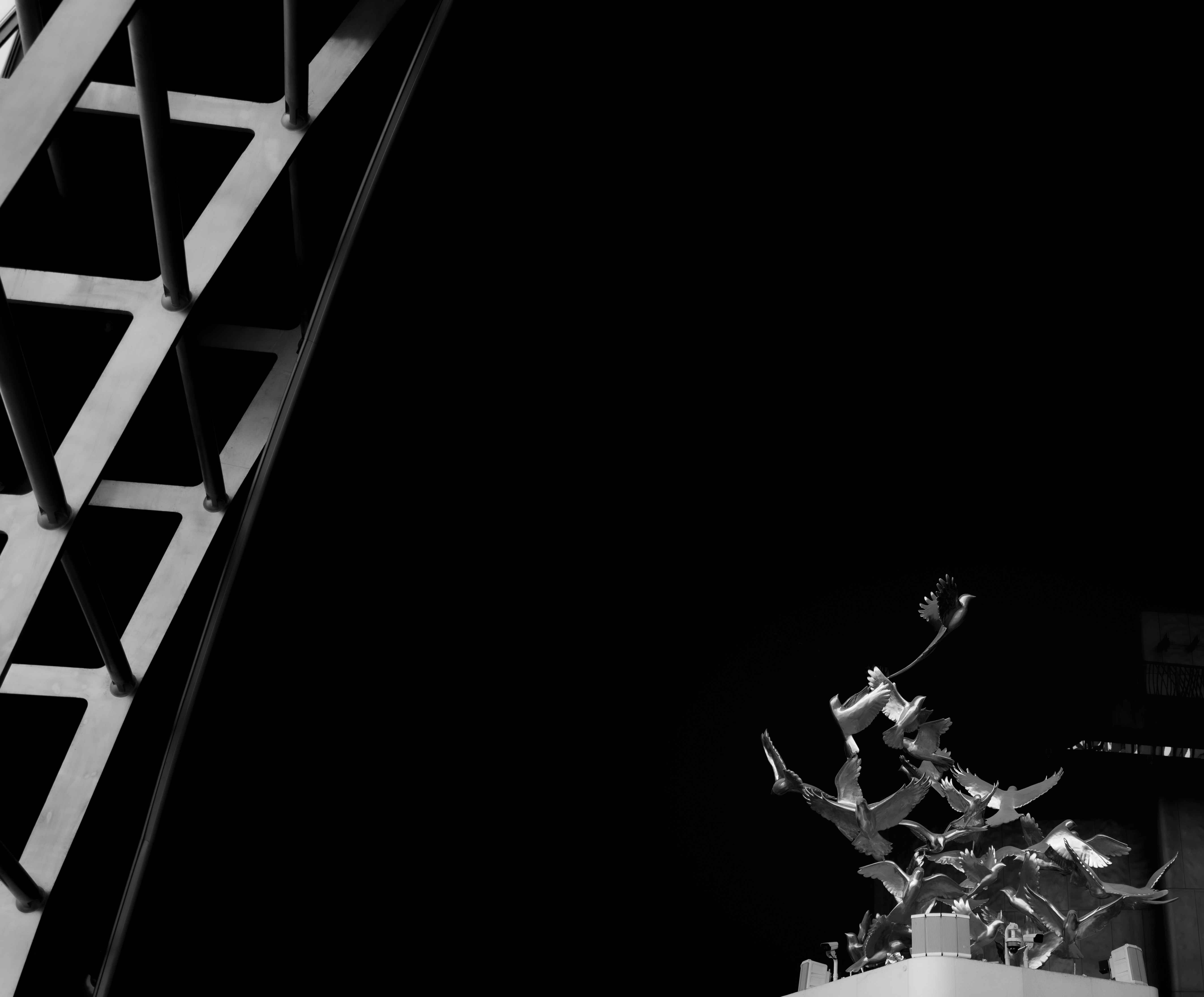 Monochrome Minimalism: Staircase Fragments Against Night Void