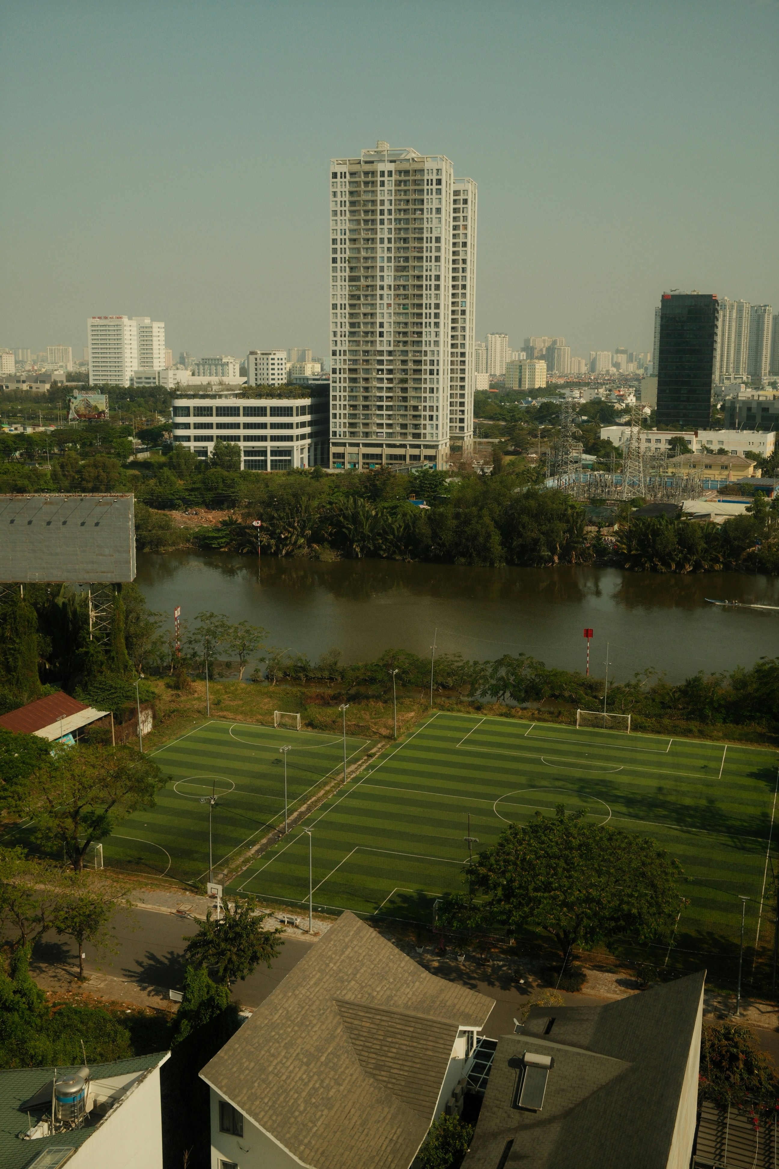 Urban Horizon: A River, a Park, and a Tower Rising Above