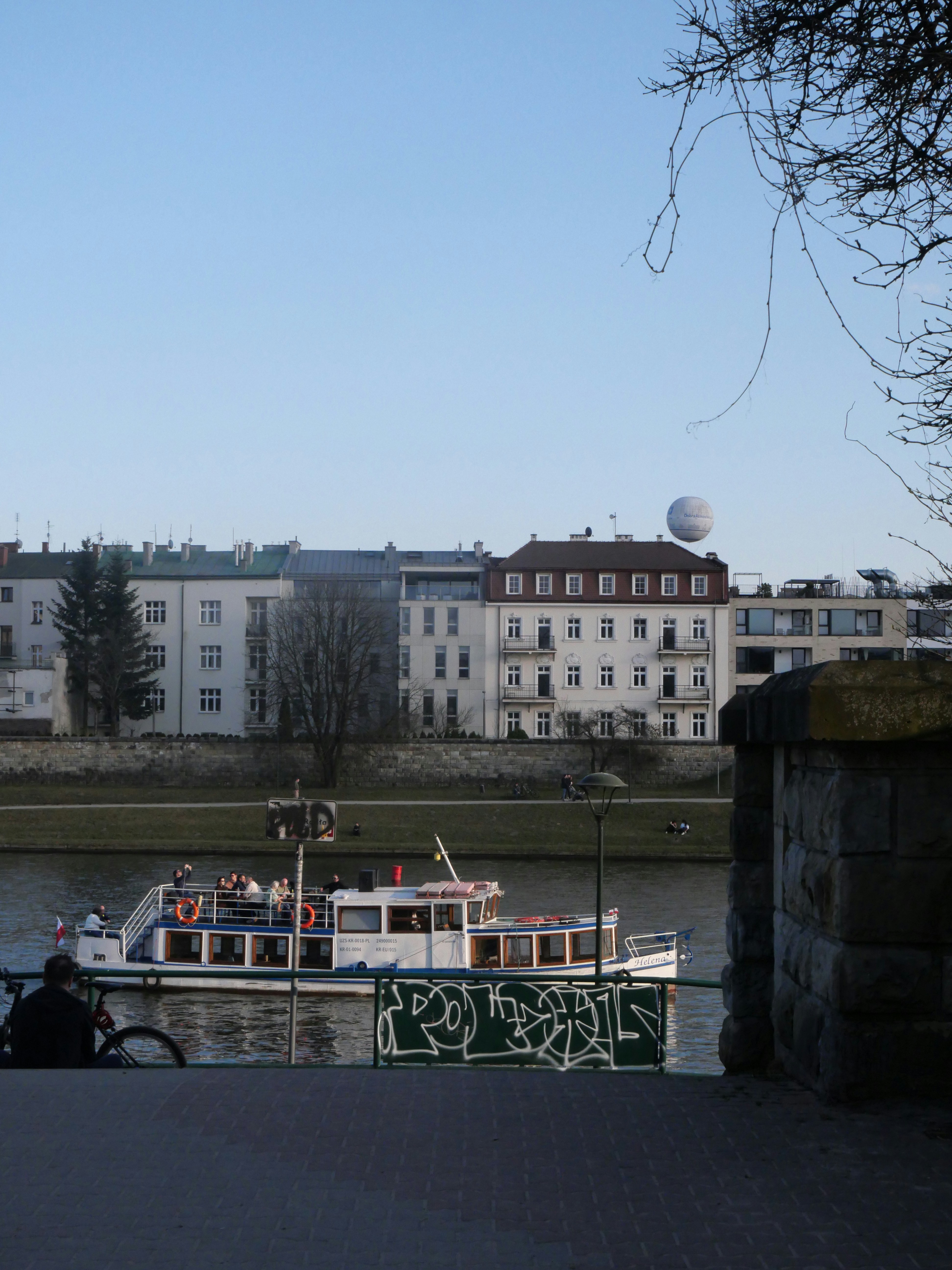 Boat on the Spree, Berlin-esque riverfront with a graffiti-ed railing