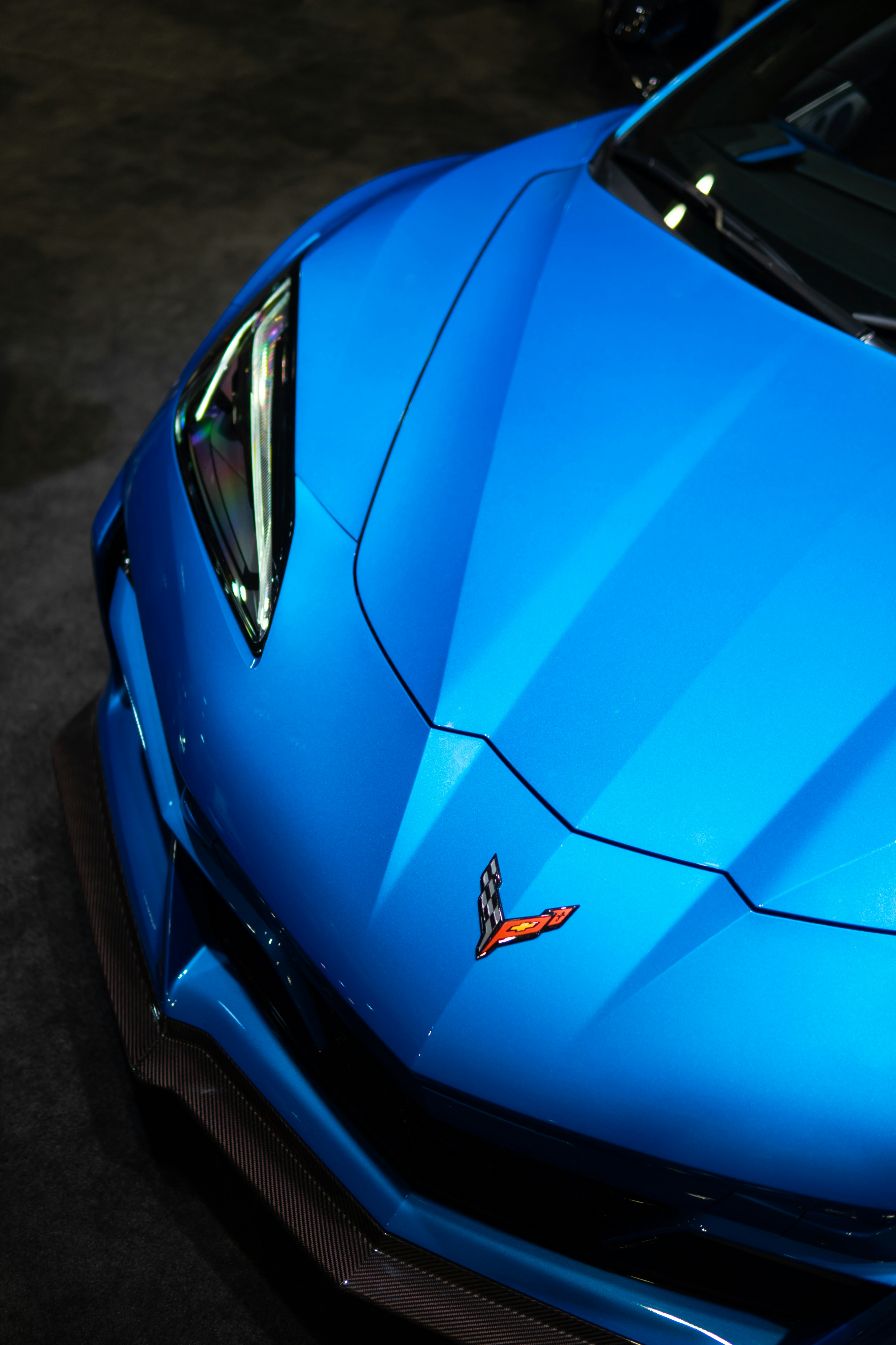 Blue Corvette Hood Convergence: Geometry, Speed, and Shine