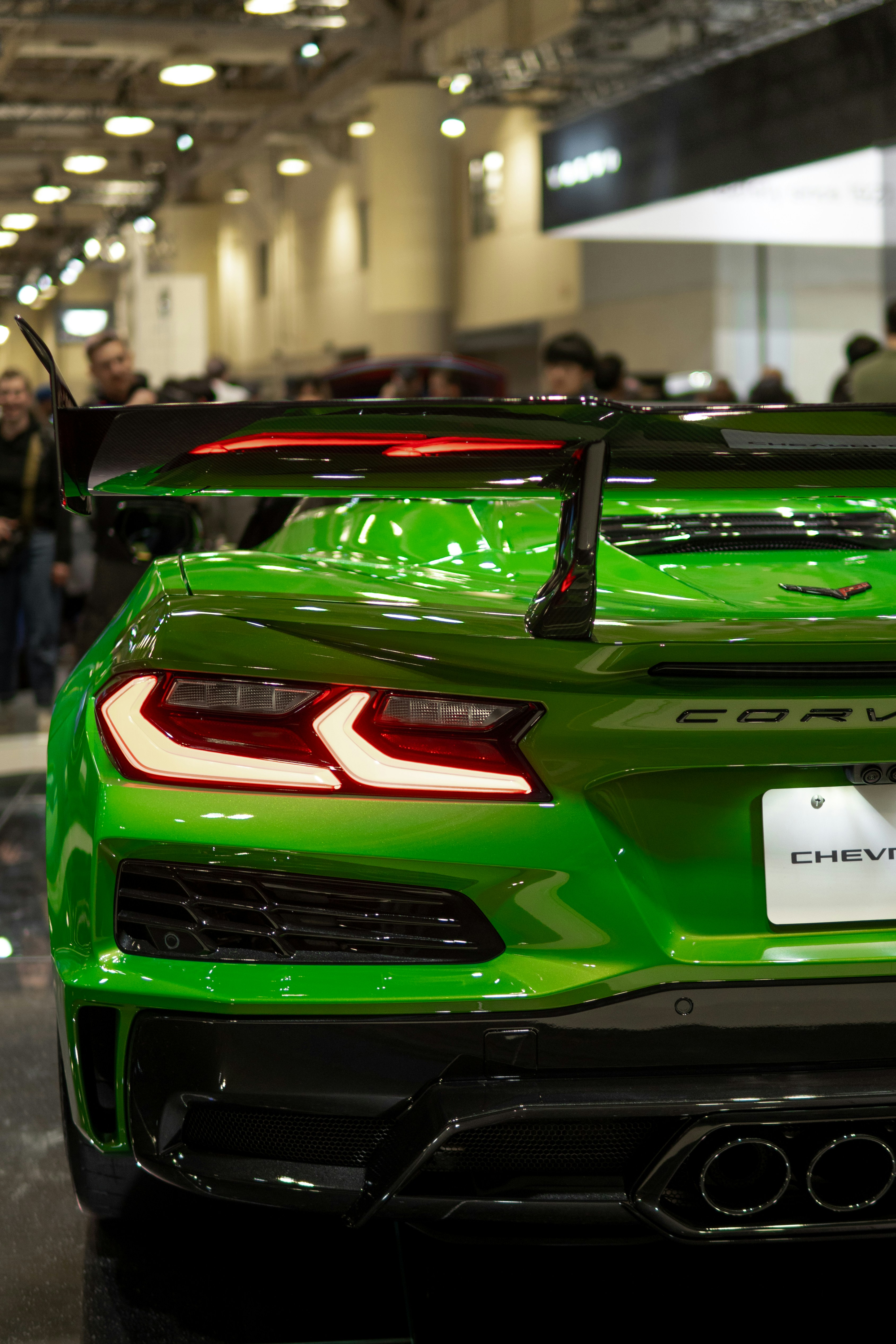 Green Thunder: Rear View of a Custom Chevy at the Auto Show