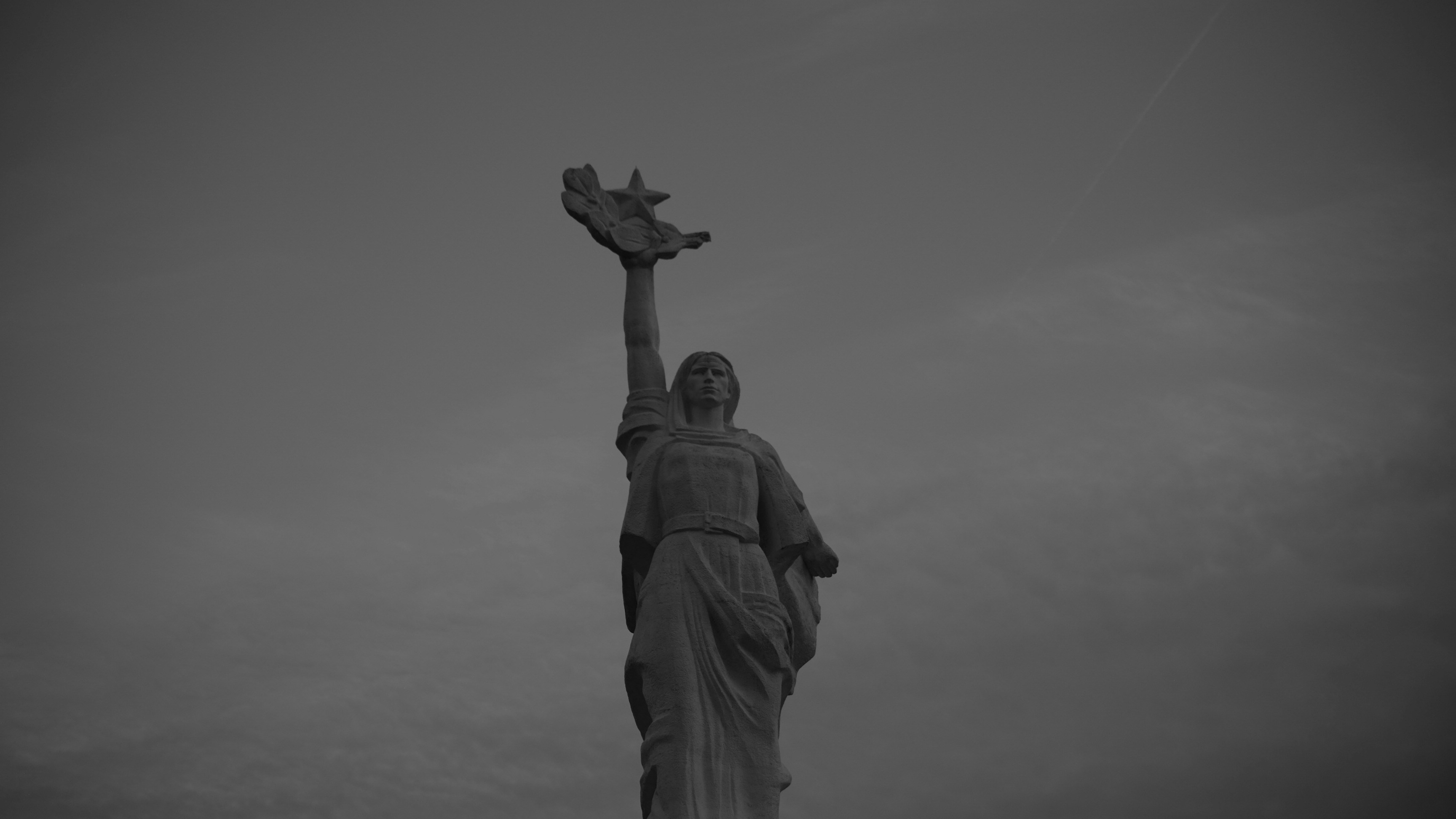 Monumental Silhouette Holding Up the Sky