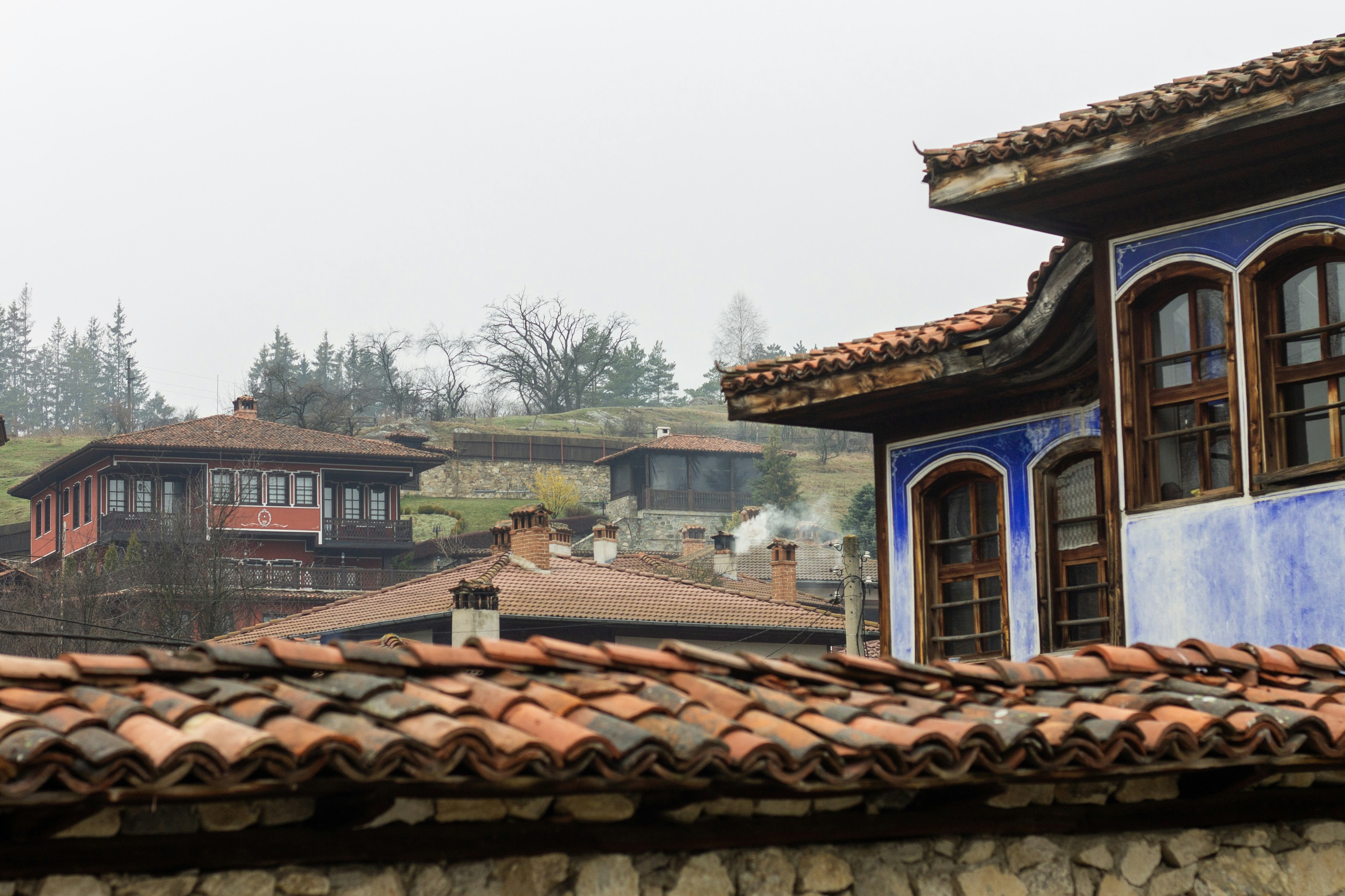 Terracotta Rooflines Receding into a Quiet Village