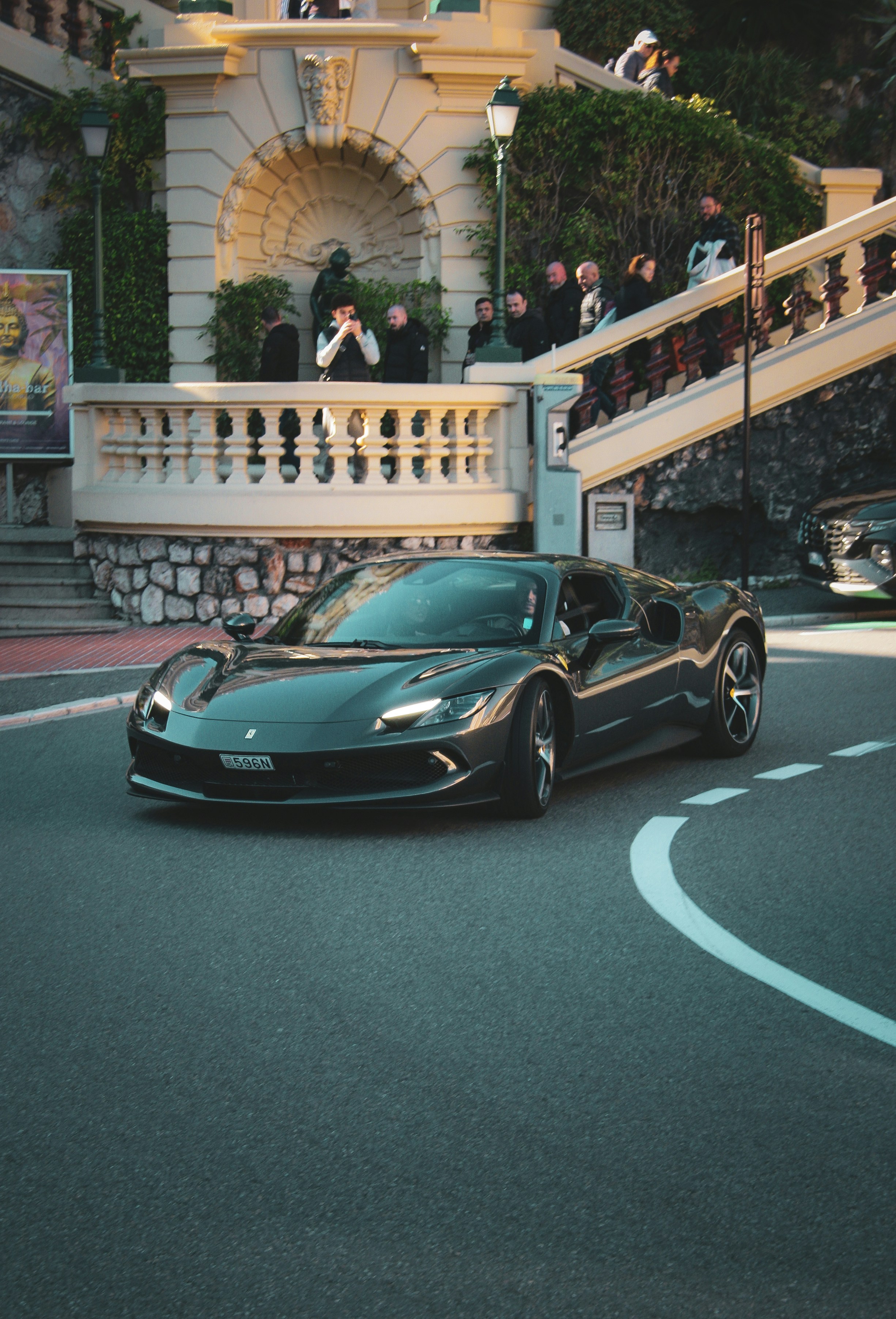 The Stratus Luxury: A Sleek Ferrari Descends Toward the Marble Terrace