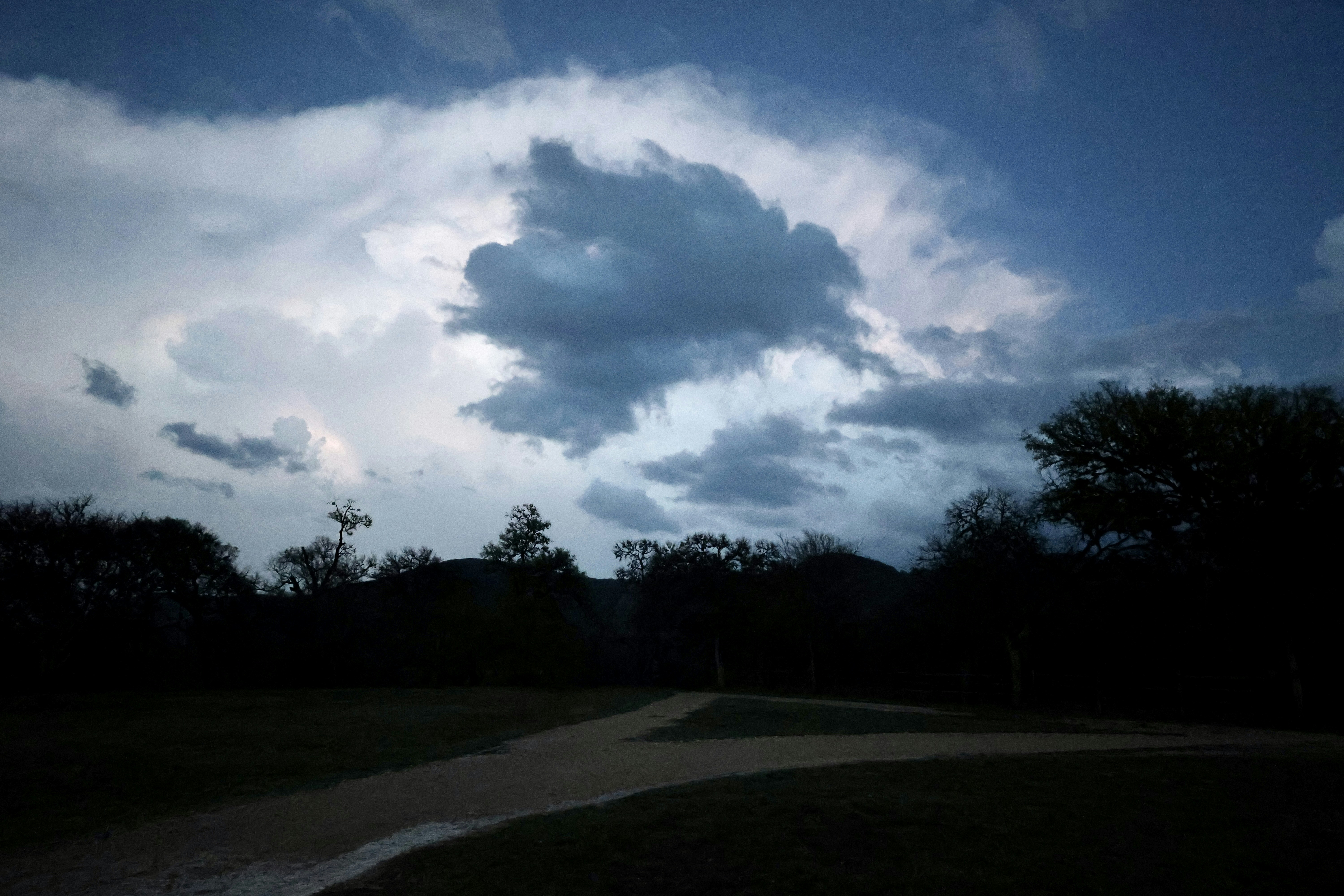 Twilight Sky Above a Quiet Park Path