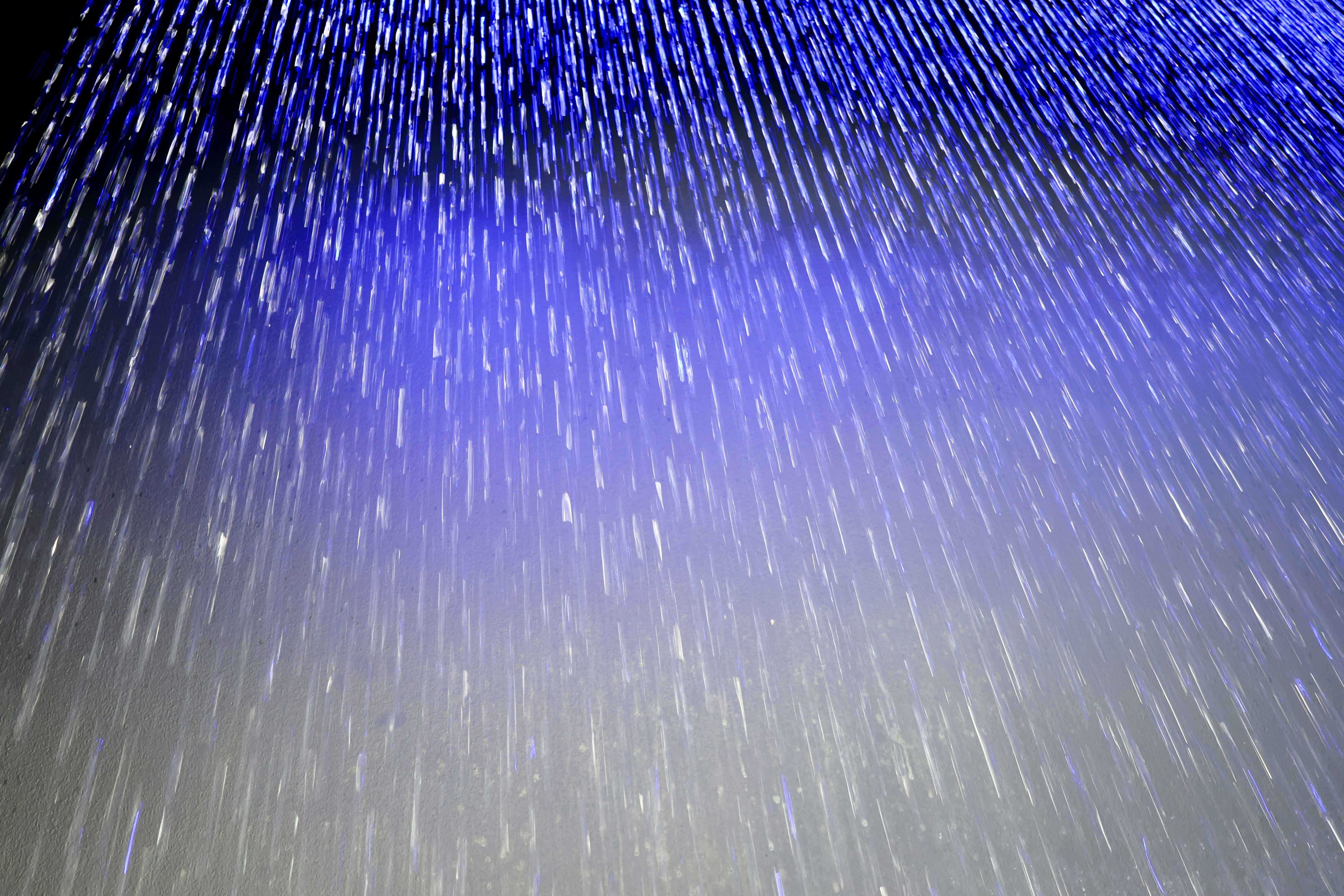 Blue Cascade: Night Rain in a Silk-like Veil