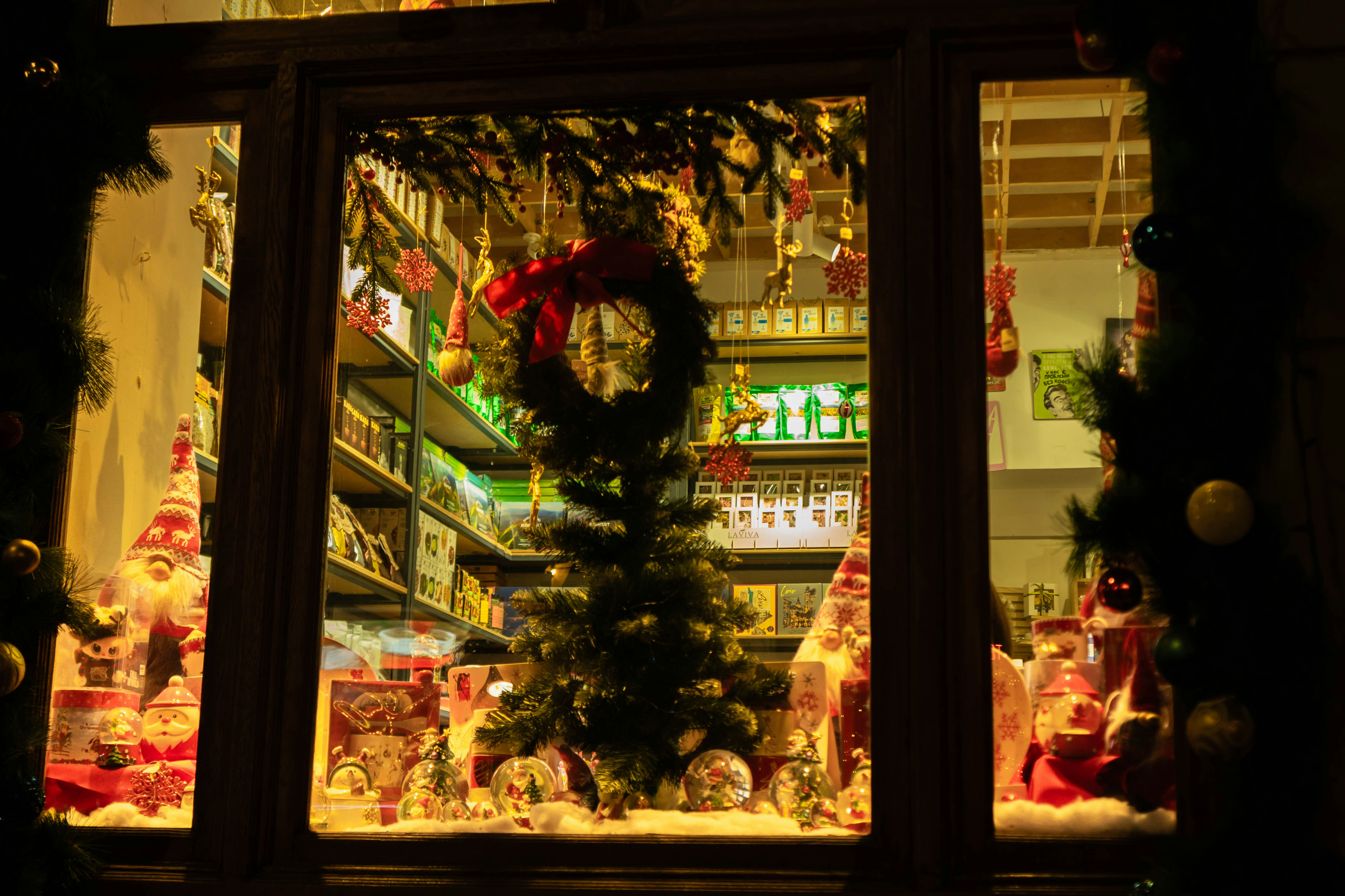 Warm Holiday Window: A Christmas Display Framed by Glass Panels