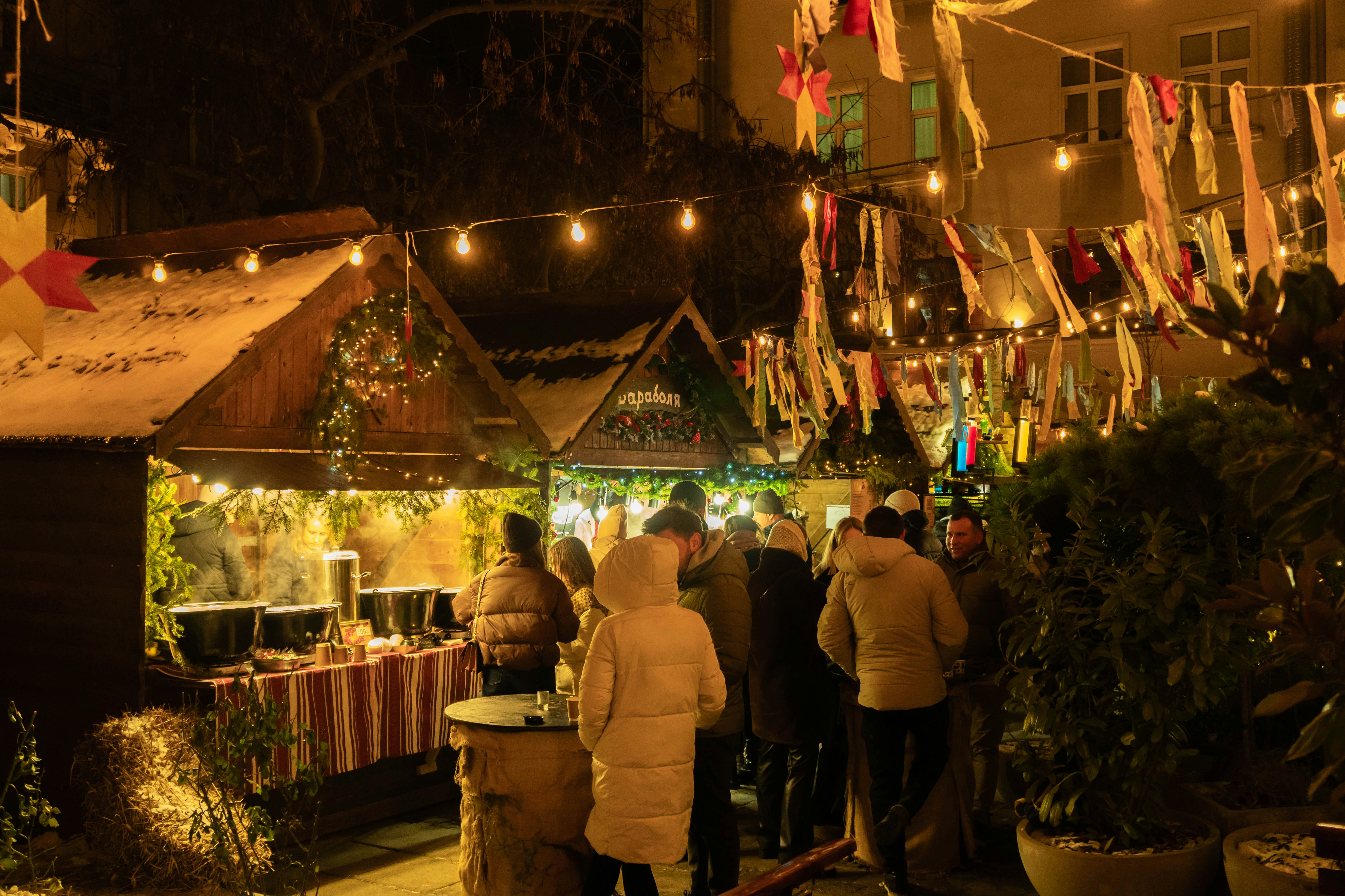 Warm Lights and Winter Feast at a Festive Market