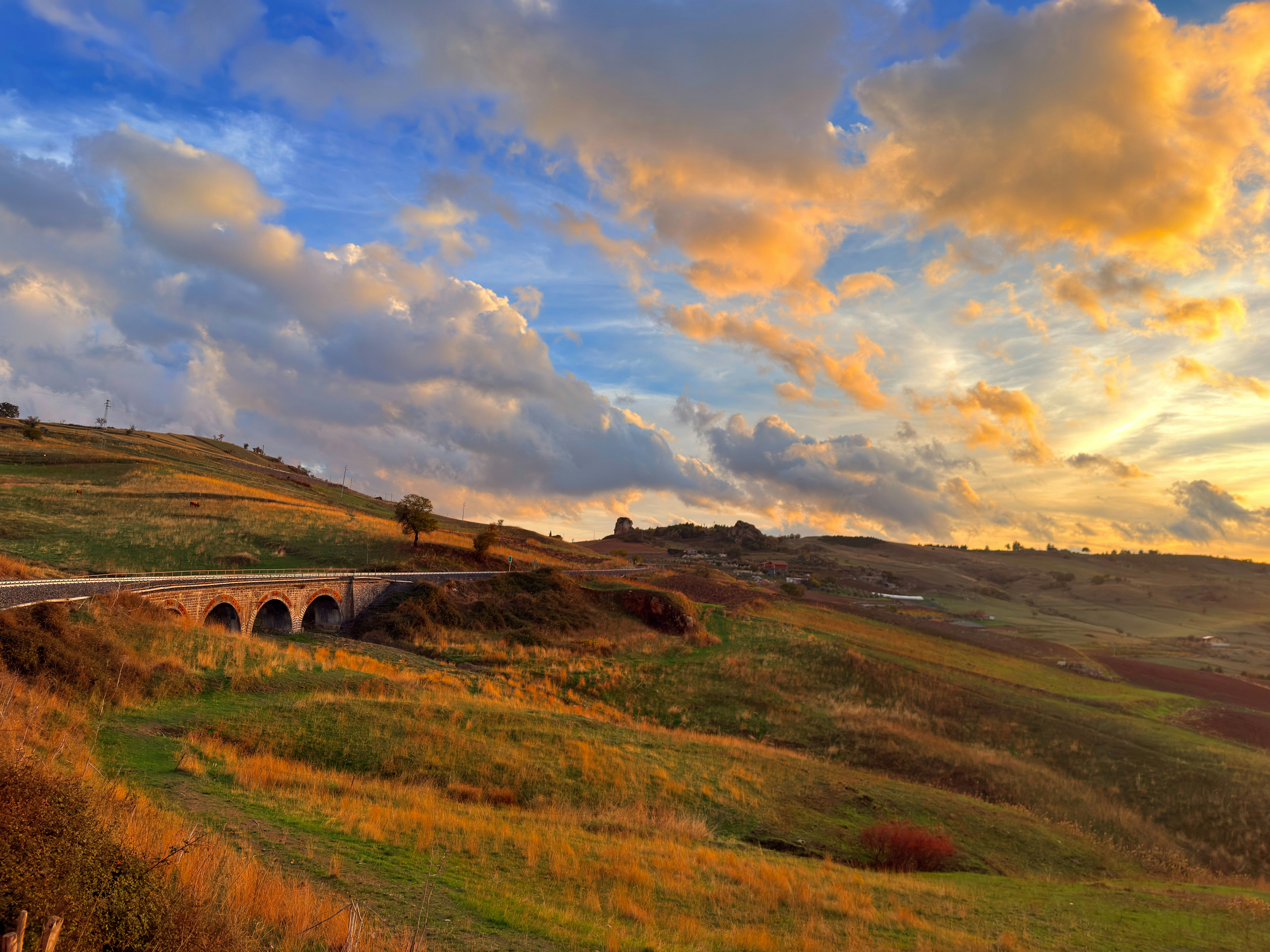 Sunlit Valley and Bridge at Golden Hour