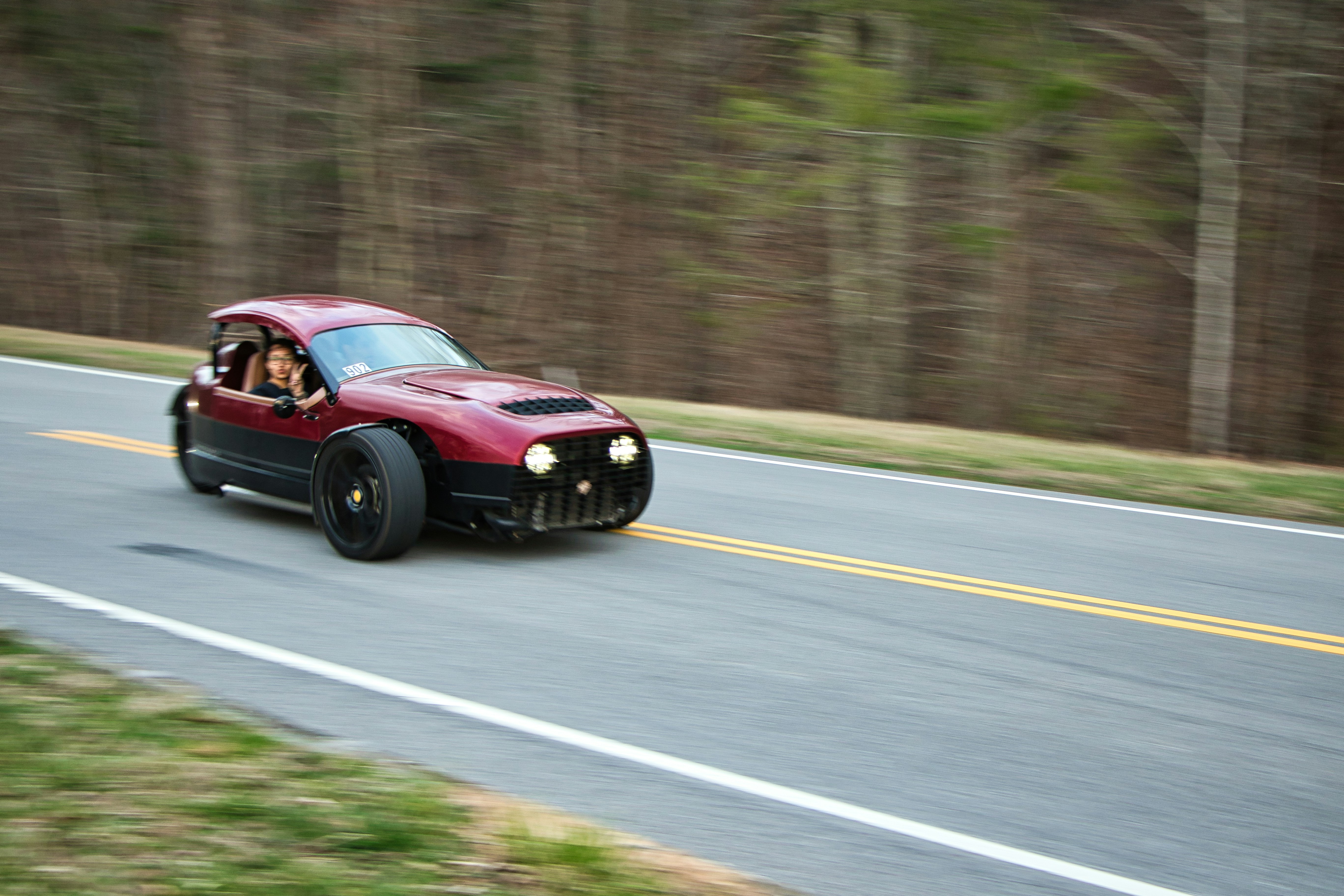 Red Bullet in a Rural Blur: A Drifting Road Rally